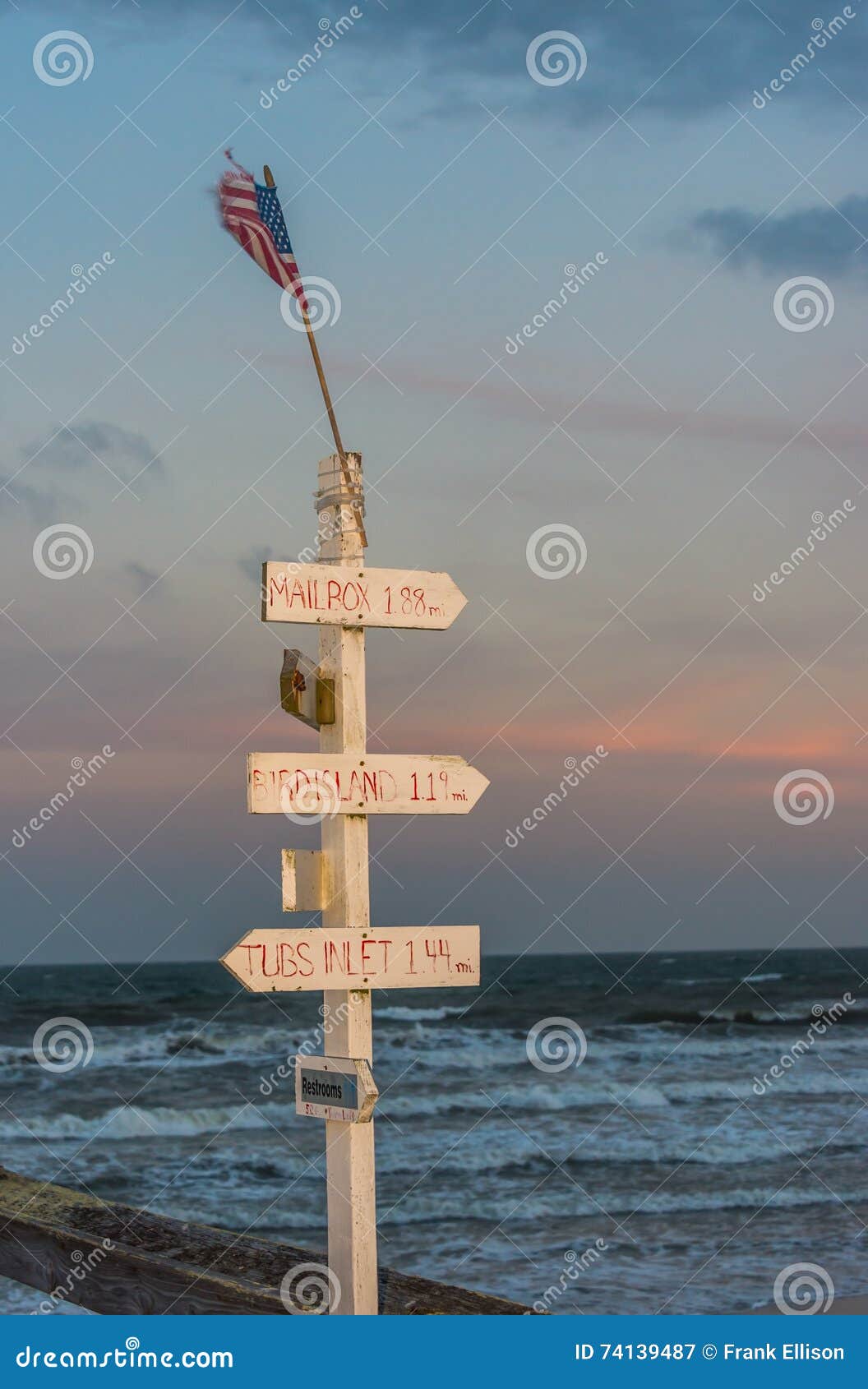 Which way stock image. Image of flag, pier, sunset, sign - 74139487