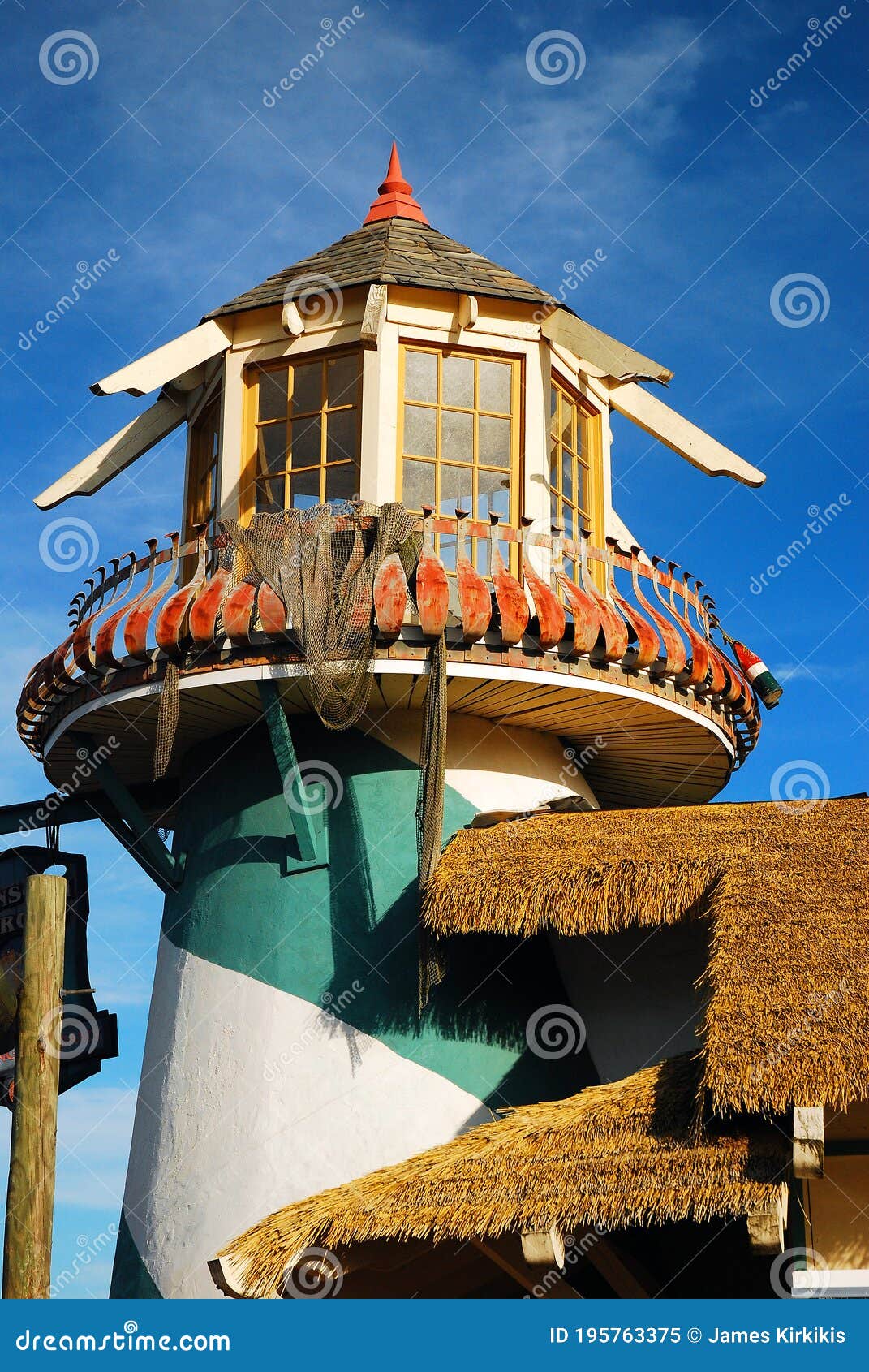 A Whimsical Lighthouse Stands at a Nautical Themed Store Editorial ...