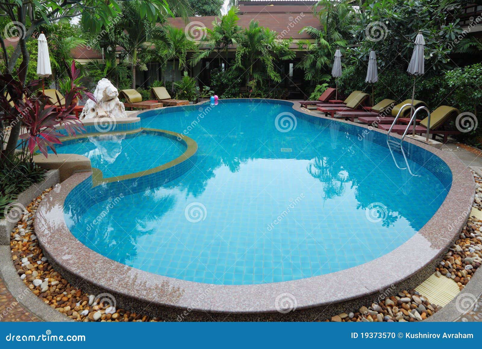 Whimsically Curved Pool with Clear Water Stock Photo - Image of ripple ...