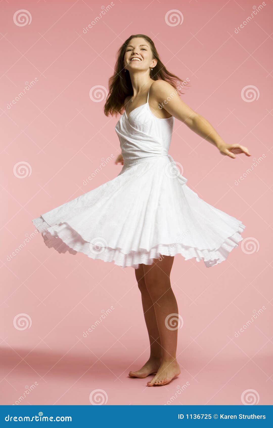 Whirling girl in white stock image. Image of dress, portrait - 1136725
