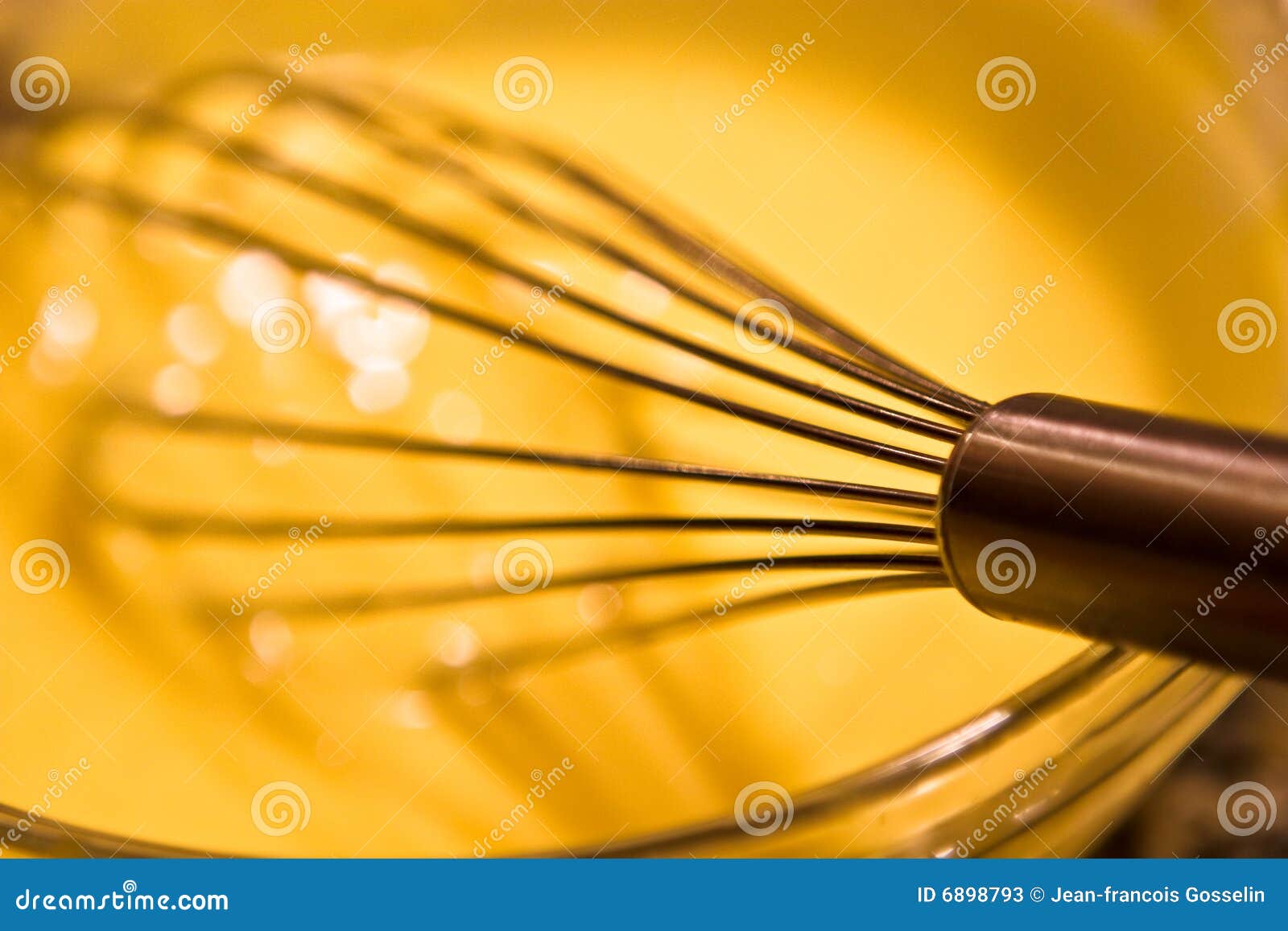 Whisk in a bowl stock image. Image of stainless, yellow - 6898793