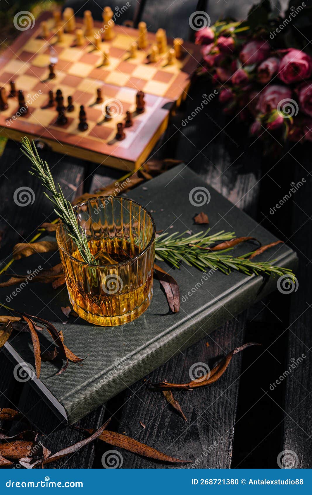 Whiskey in a Glass with Ice and a Chessboard Stock Photo - Image of ...