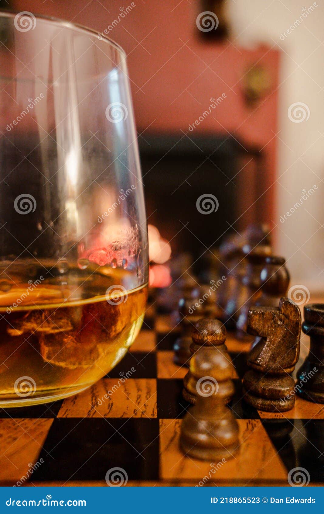 Whiskey Glass on a Chess Board Stock Image - Image of gold, checkered ...