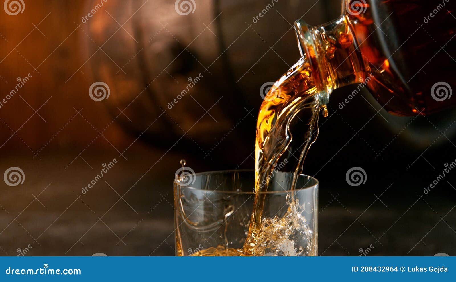 Whiskey Liquid Falling into Glass Stock Photo - Image of drink, camera ...