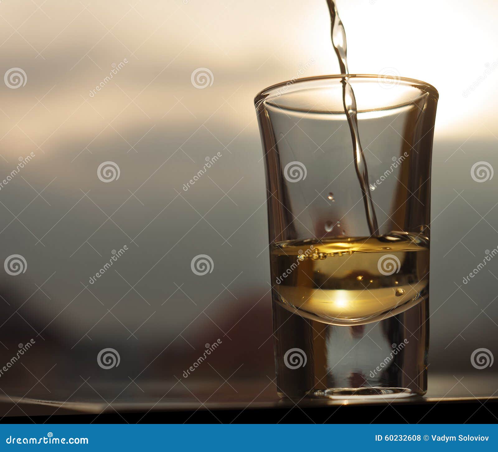 Whiskey Pouring into Shot Glass Stock Photo - Image of beverage ...