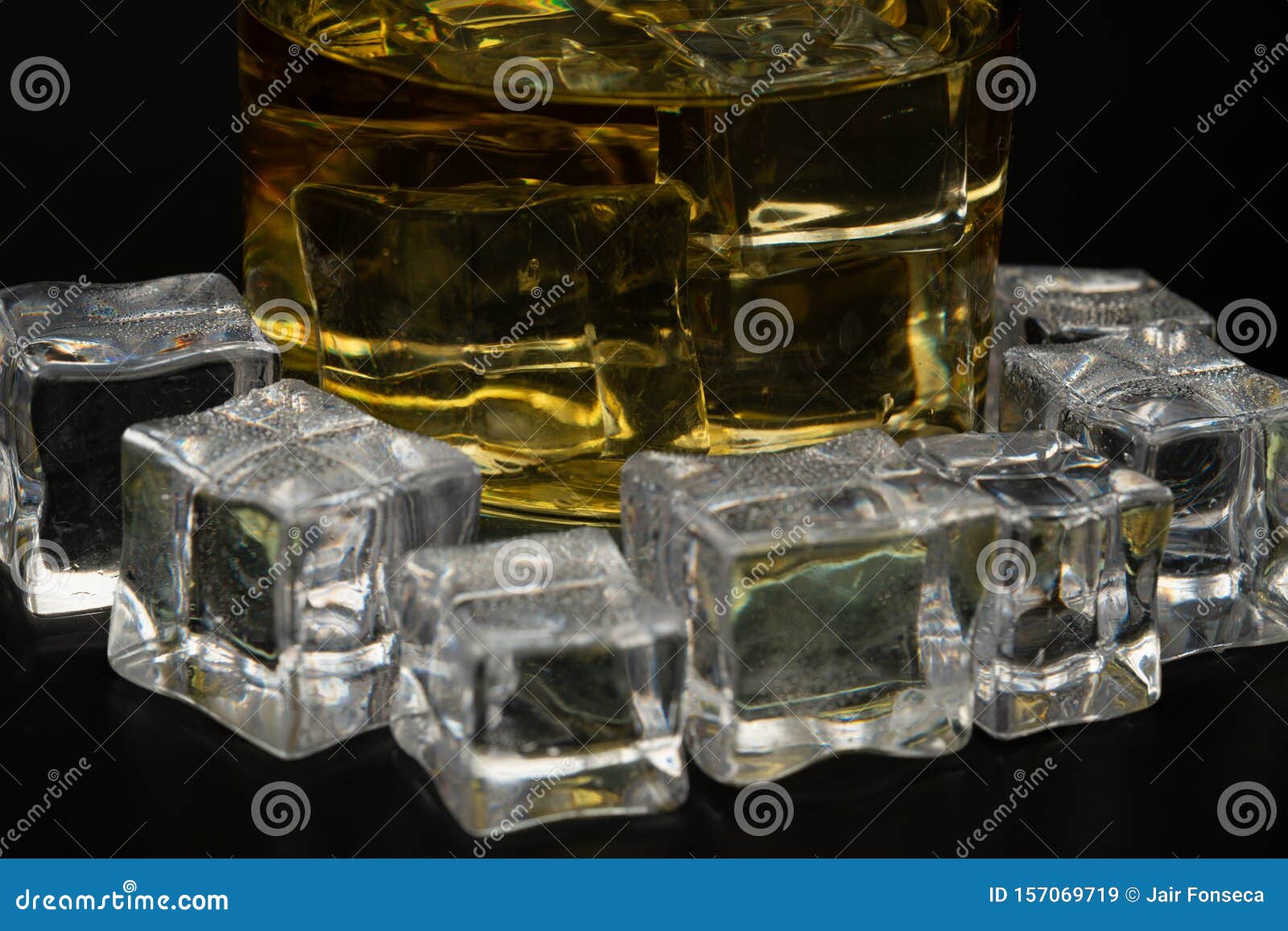 Whiskey in the Rocks, Glass of Whiskey with Ice Cubes Stock Image ...