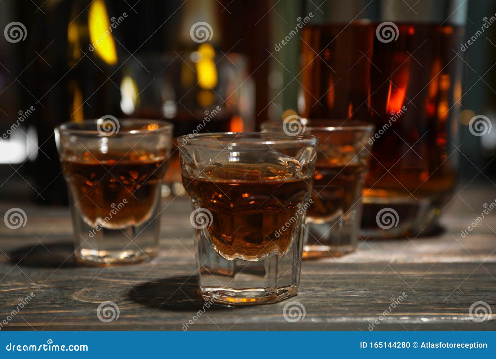 Whiskey Shots on Wooden Table Stock Photo - Image of brandy, beverage ...