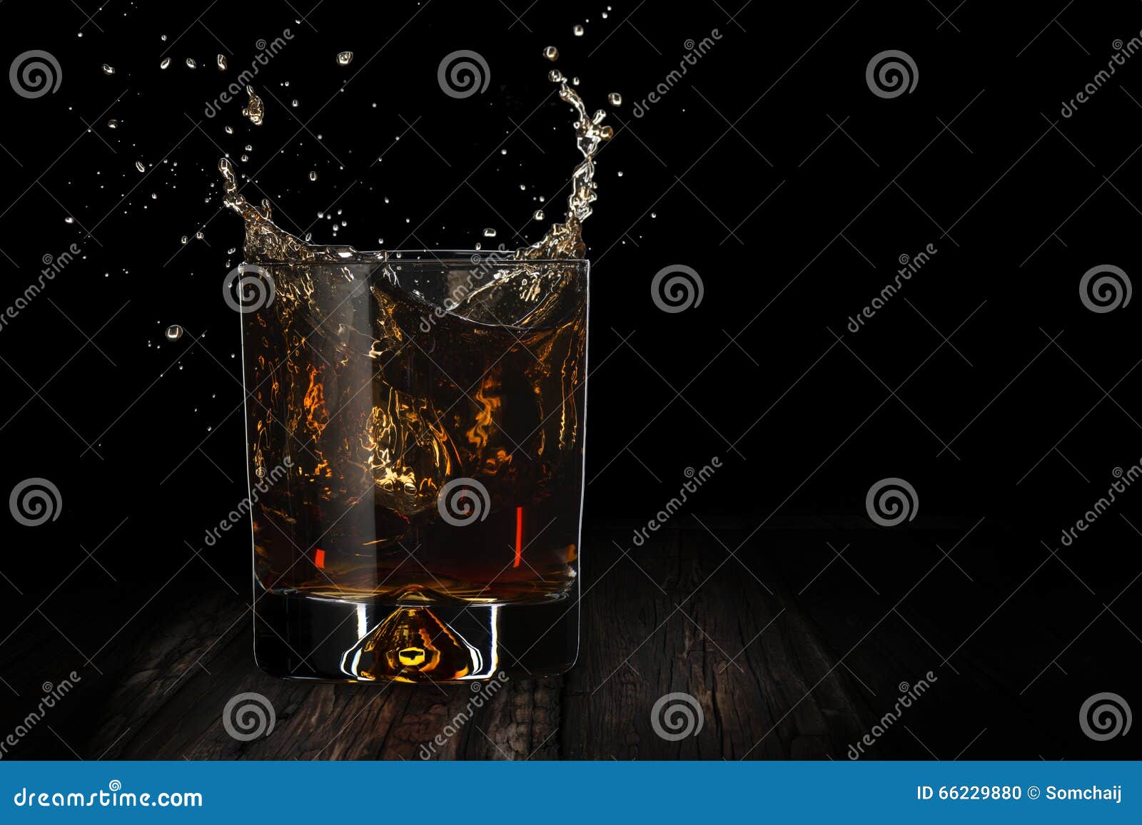 Whiskey Splash stock photo. Image of elegant, glass, dark - 66229880