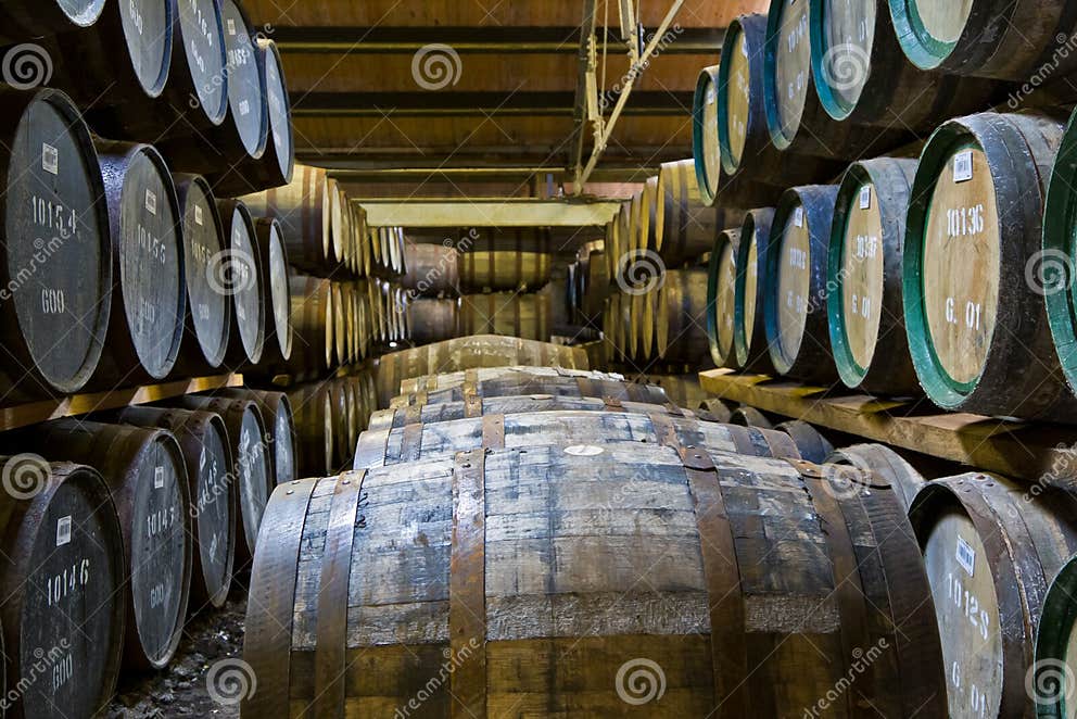 Whisky Barrels in a Distillery Stock Photo - Image of scotland, stacked ...