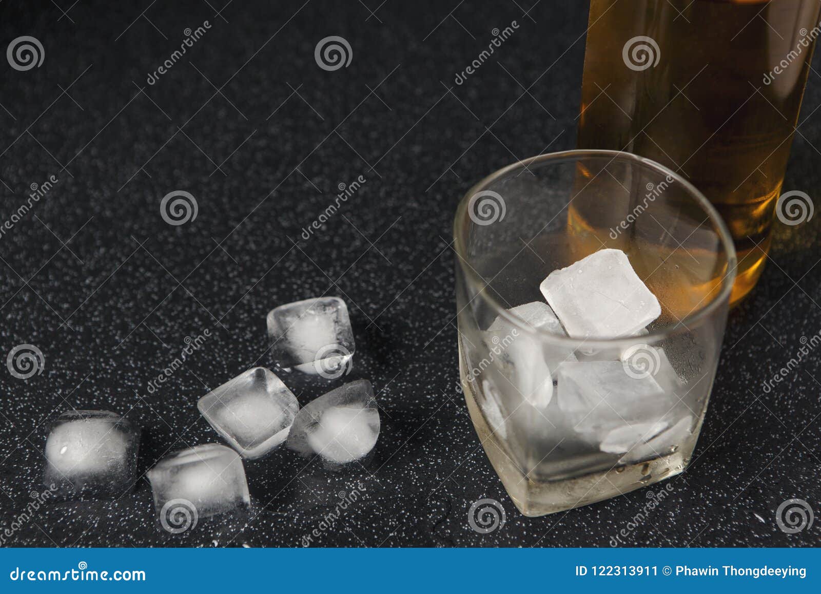 Whisky and Glass Drop Ice Cubes Stock Image - Image of reflection ...