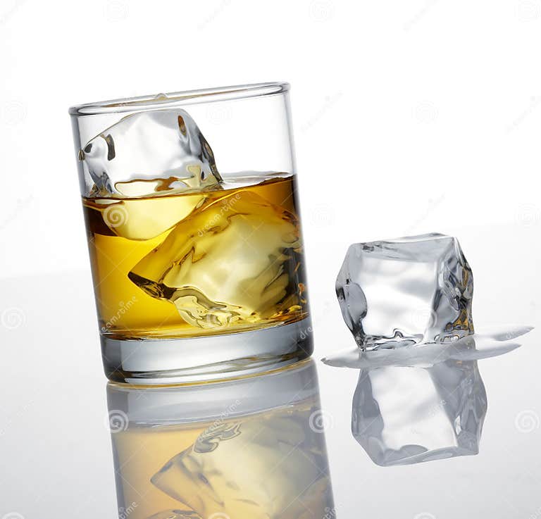 Whisky and ice cube stock image. Image of liquor, golden - 5099901