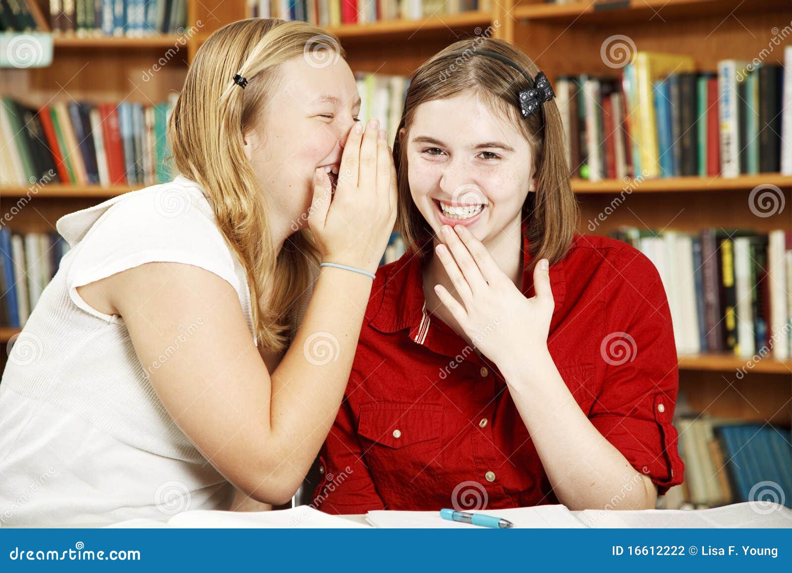 Whispering in Class stock photo. Image of girl, gossip - 16612222