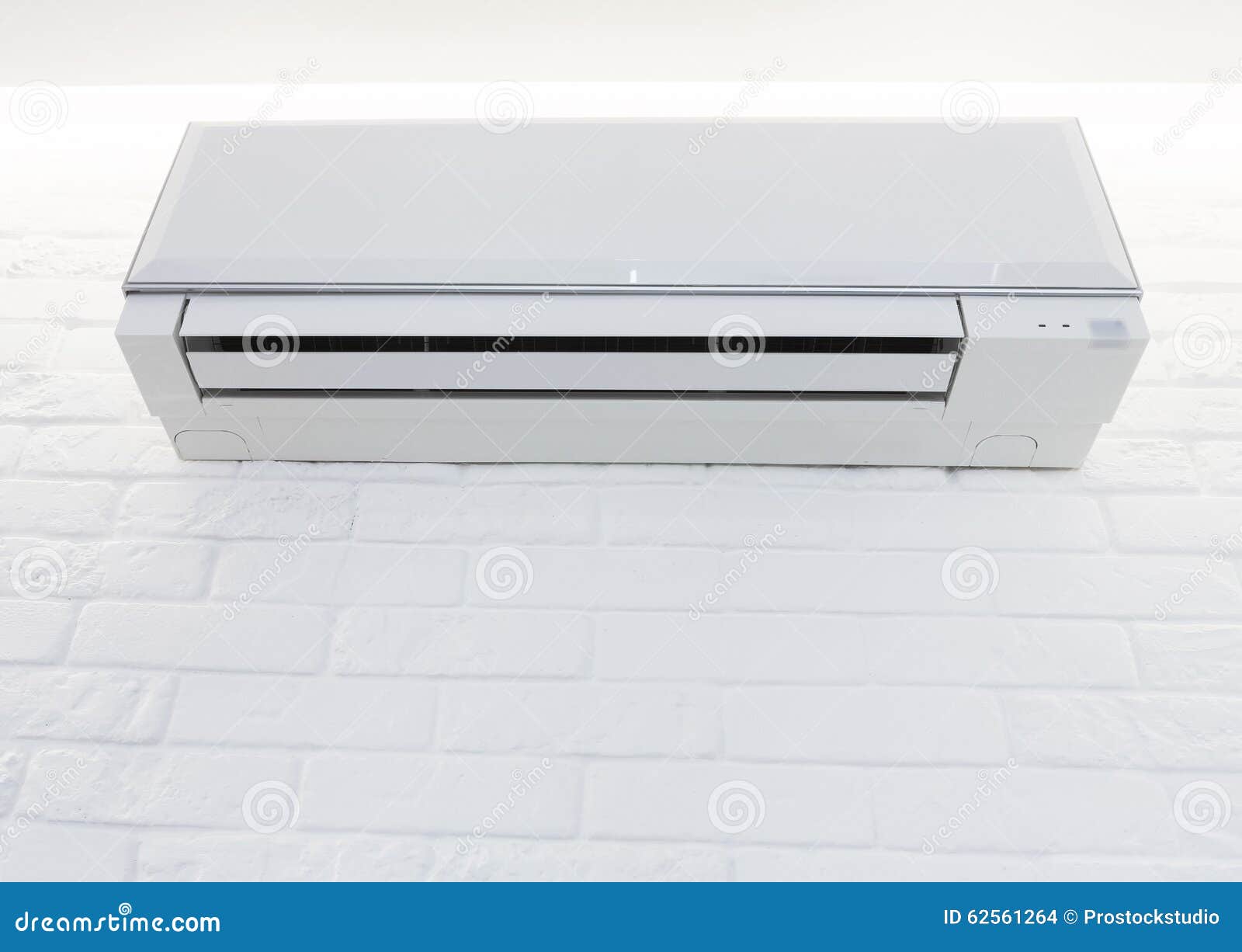 White Air Conditioner Mounted on the Brick Painted Wall Stock Photo ...