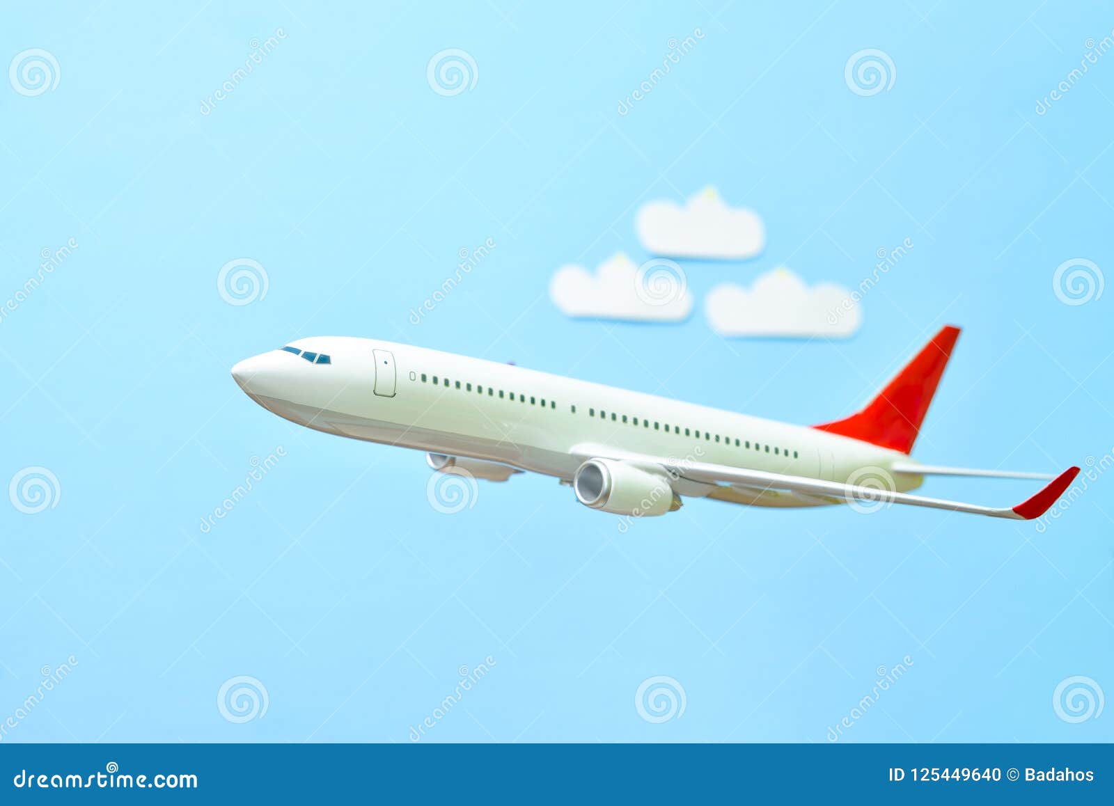 White airplane on a blue stock photo. Image of fuselage - 125449640