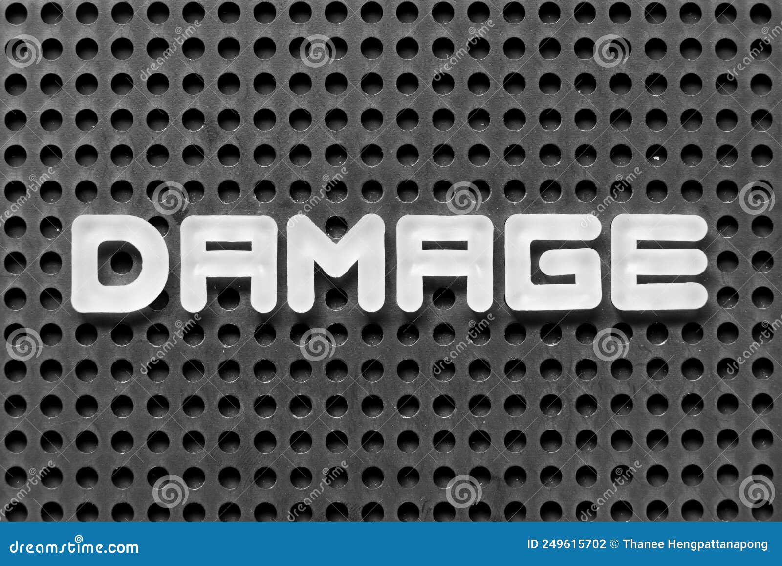 White Letter in Word Damage on Black Pegboard Background Stock Photo ...
