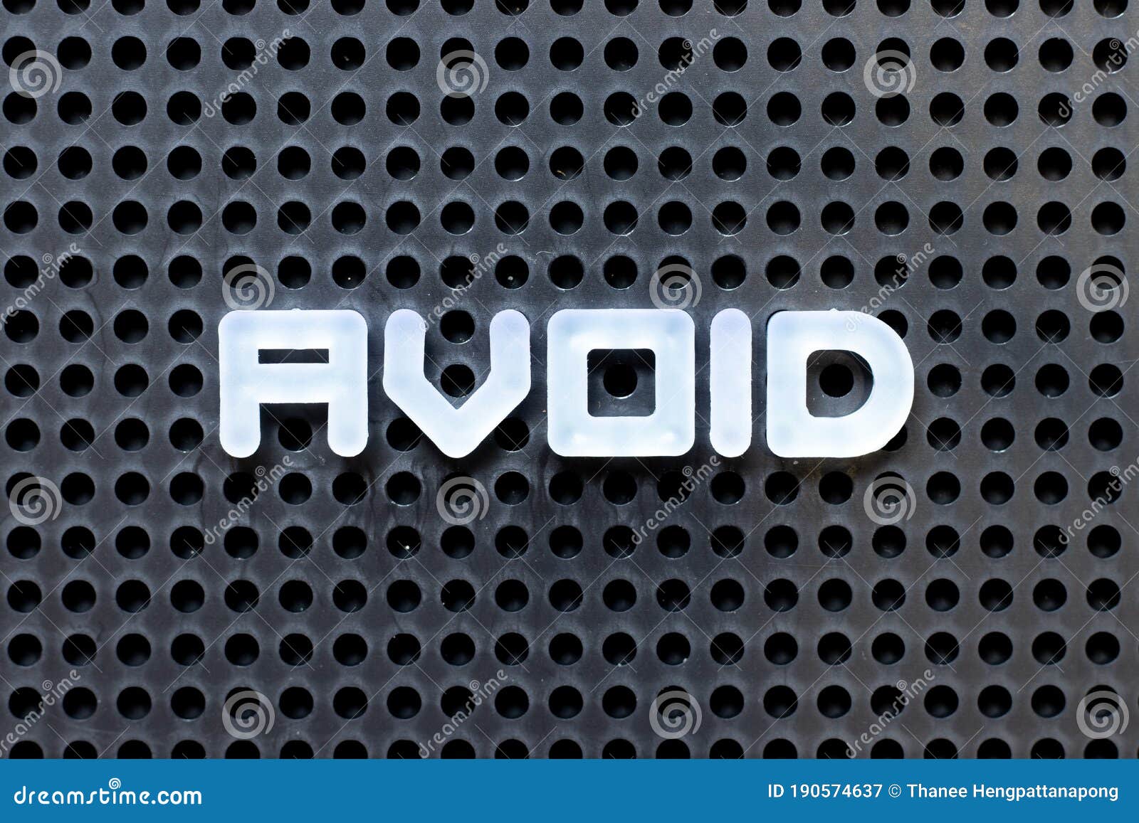 White Alphabet with Word Avoid on Black Pegboard Background Stock Image ...