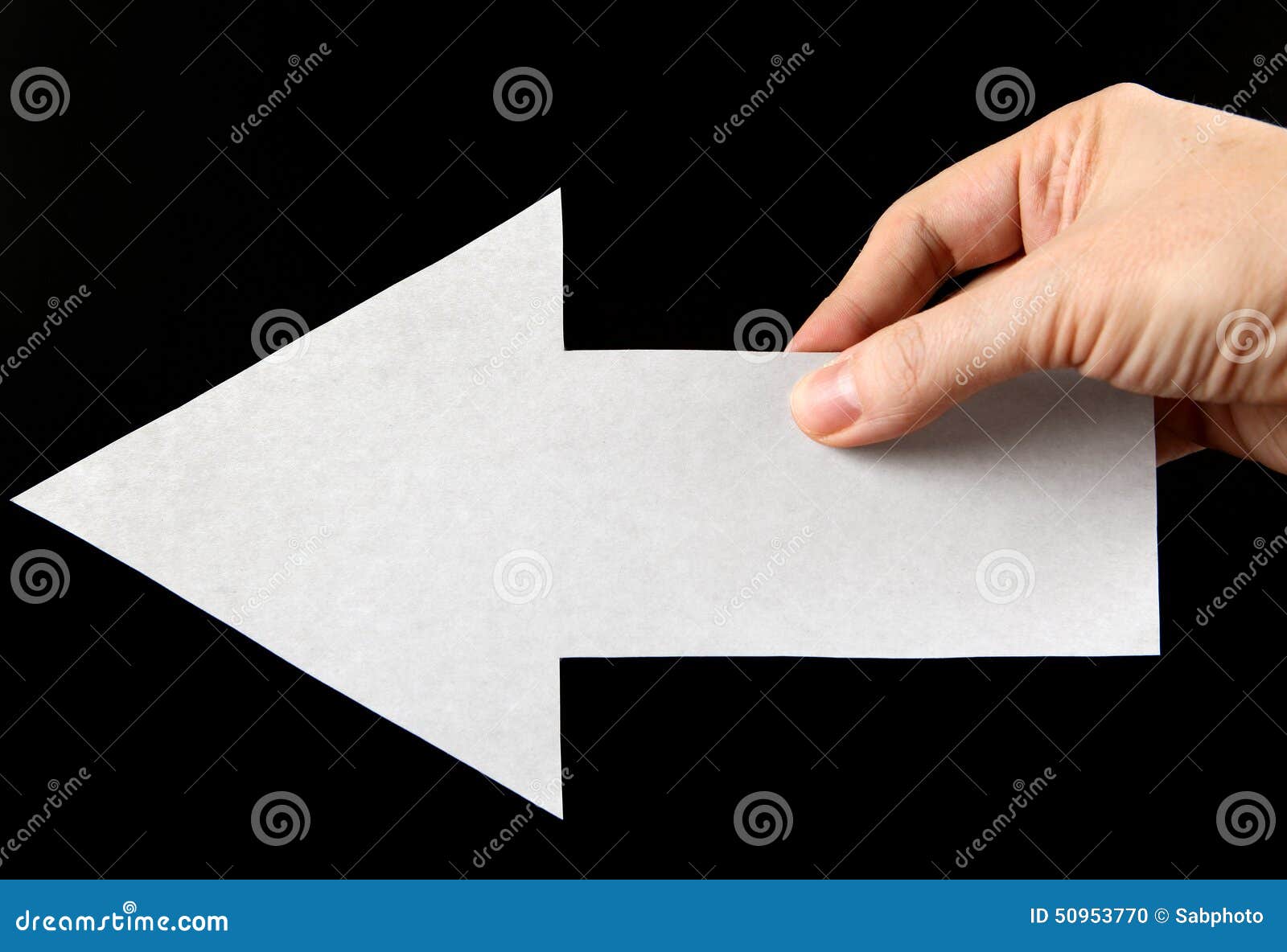White Arrow in the Hand stock photo. Image of hand, hold - 50953770