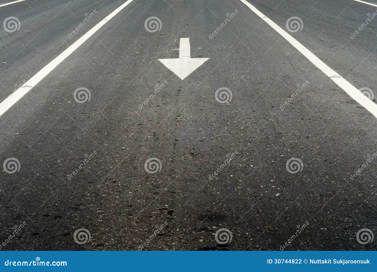 White Arrow and Line on Road Stock Photo - Image of texture, gray: 30744822