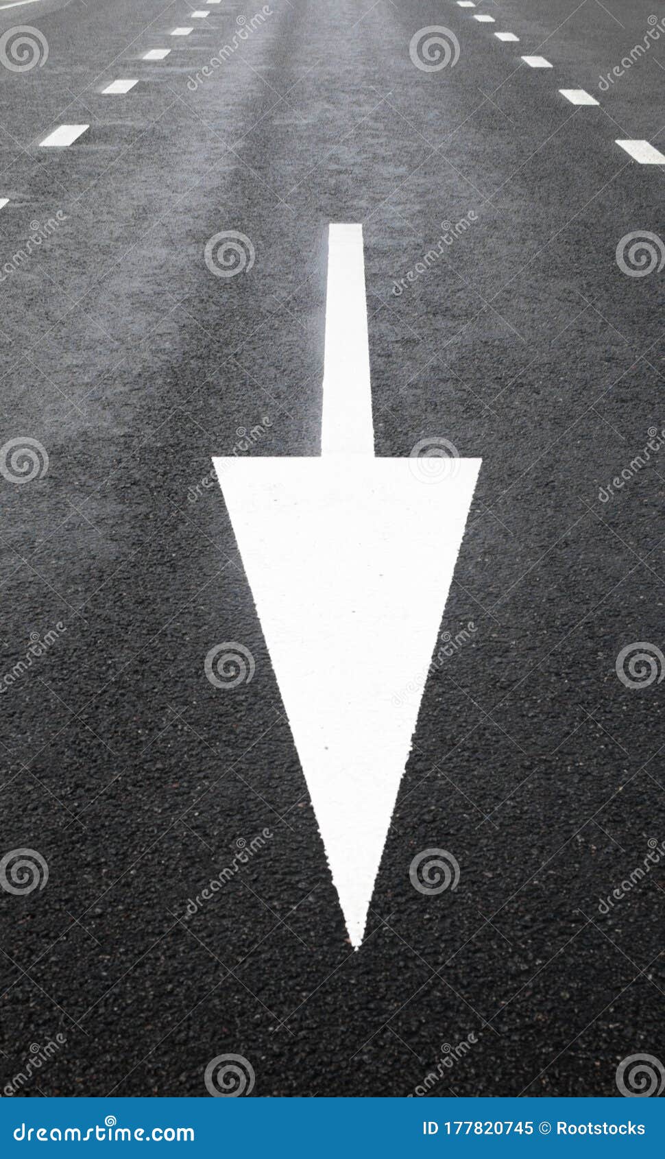 White arrow on the road stock image. Image of direction - 177820745