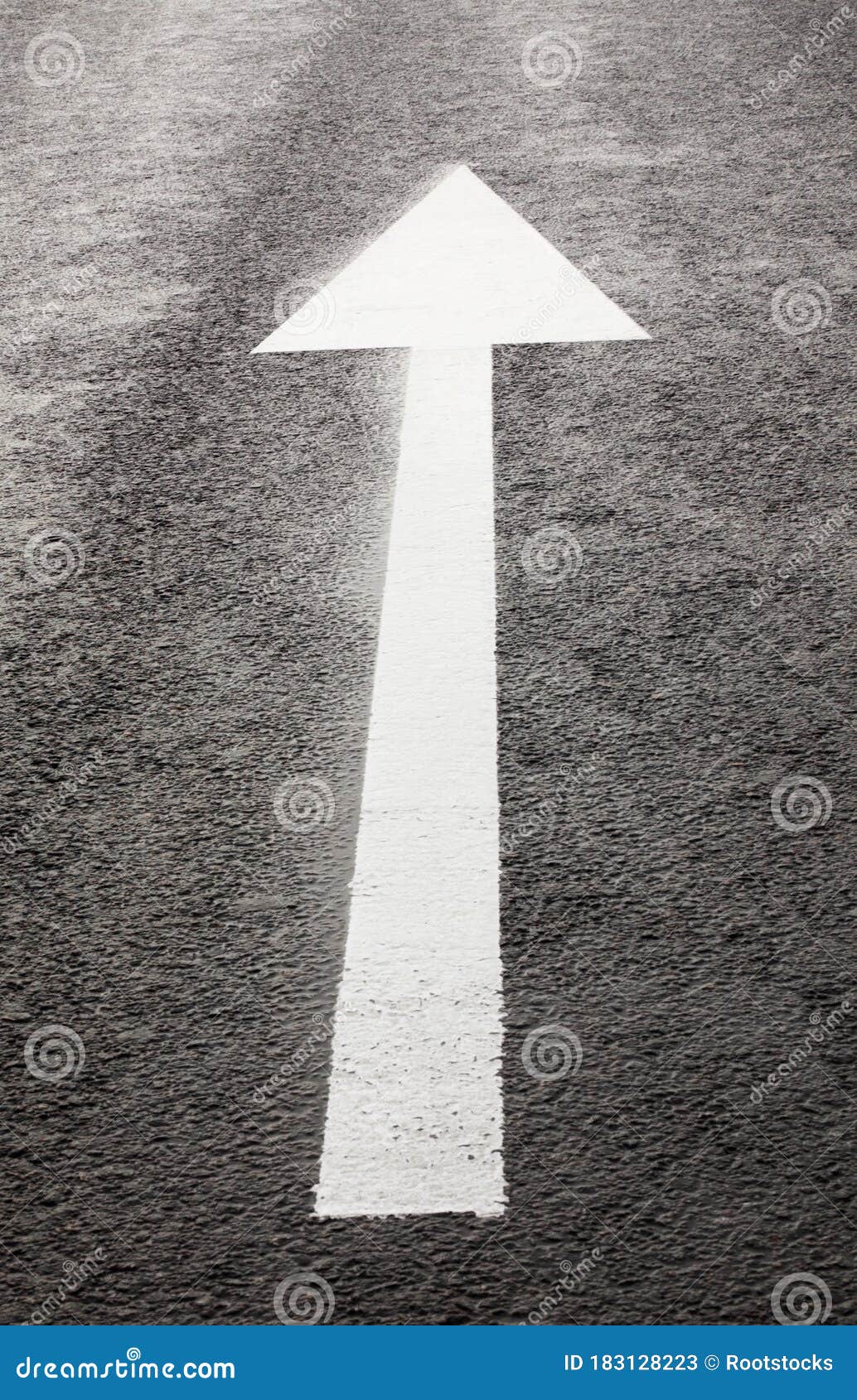 White arrow on the road stock image. Image of directional - 183128223
