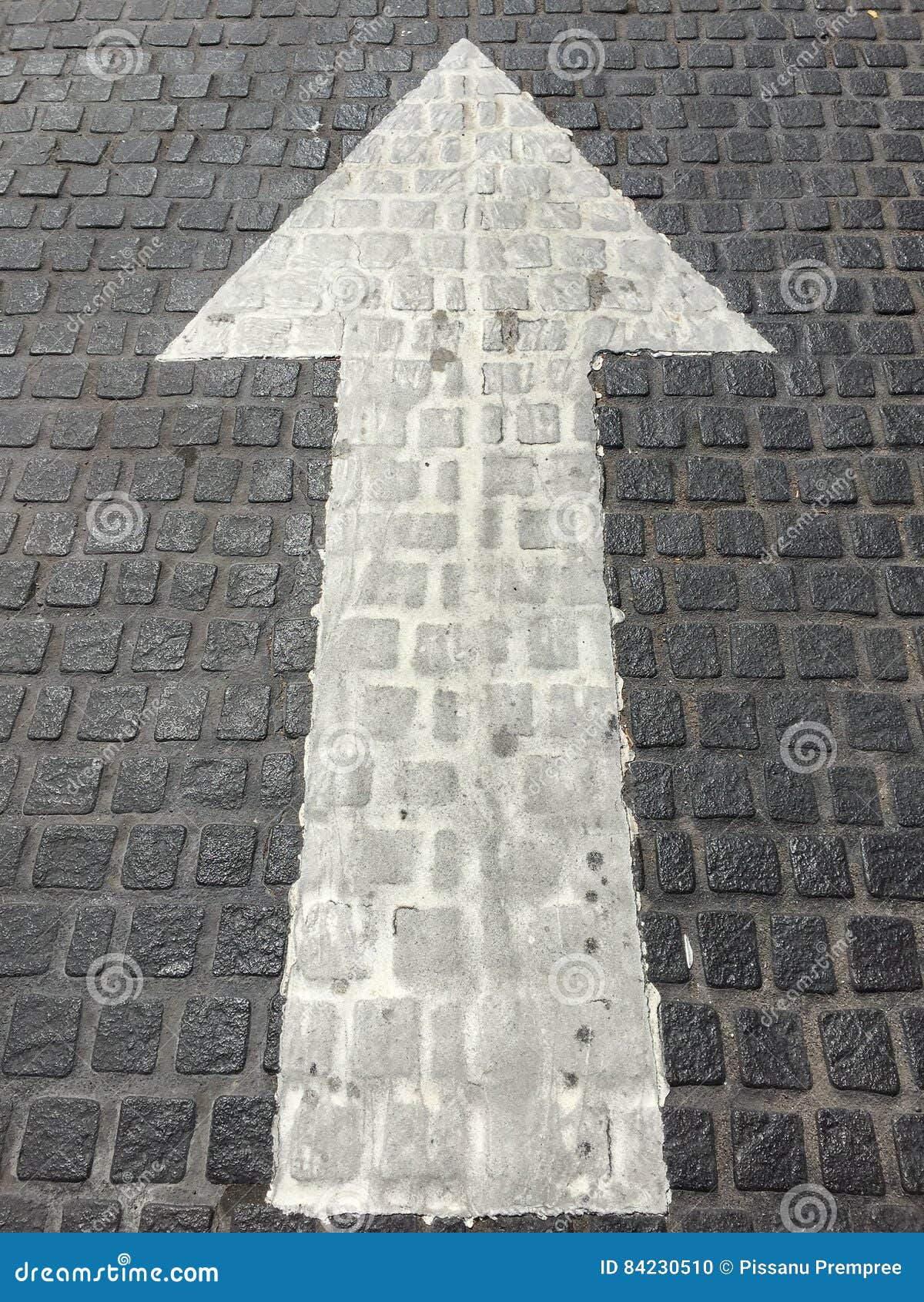 White Arrow Sing on the Stone Bricks Stock Photo - Image of advertising ...