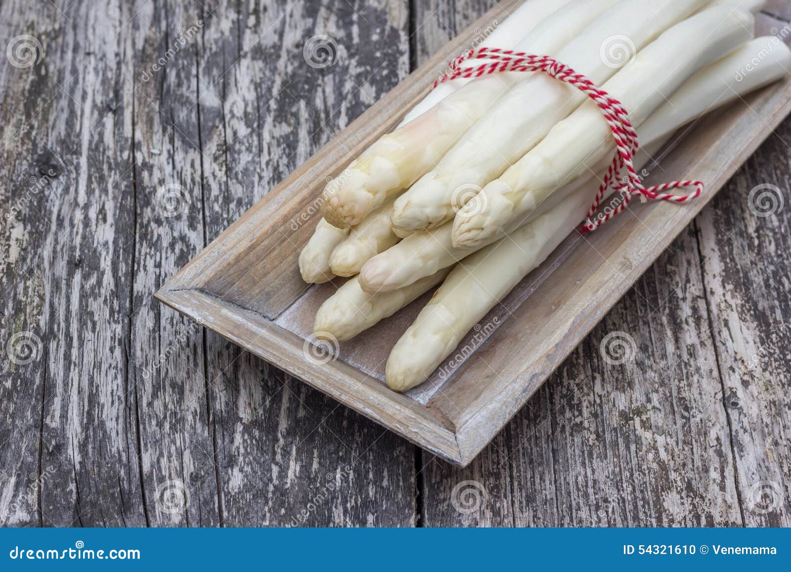 White Asparagus on a Wooden Plate Stock Photo - Image of string, table ...