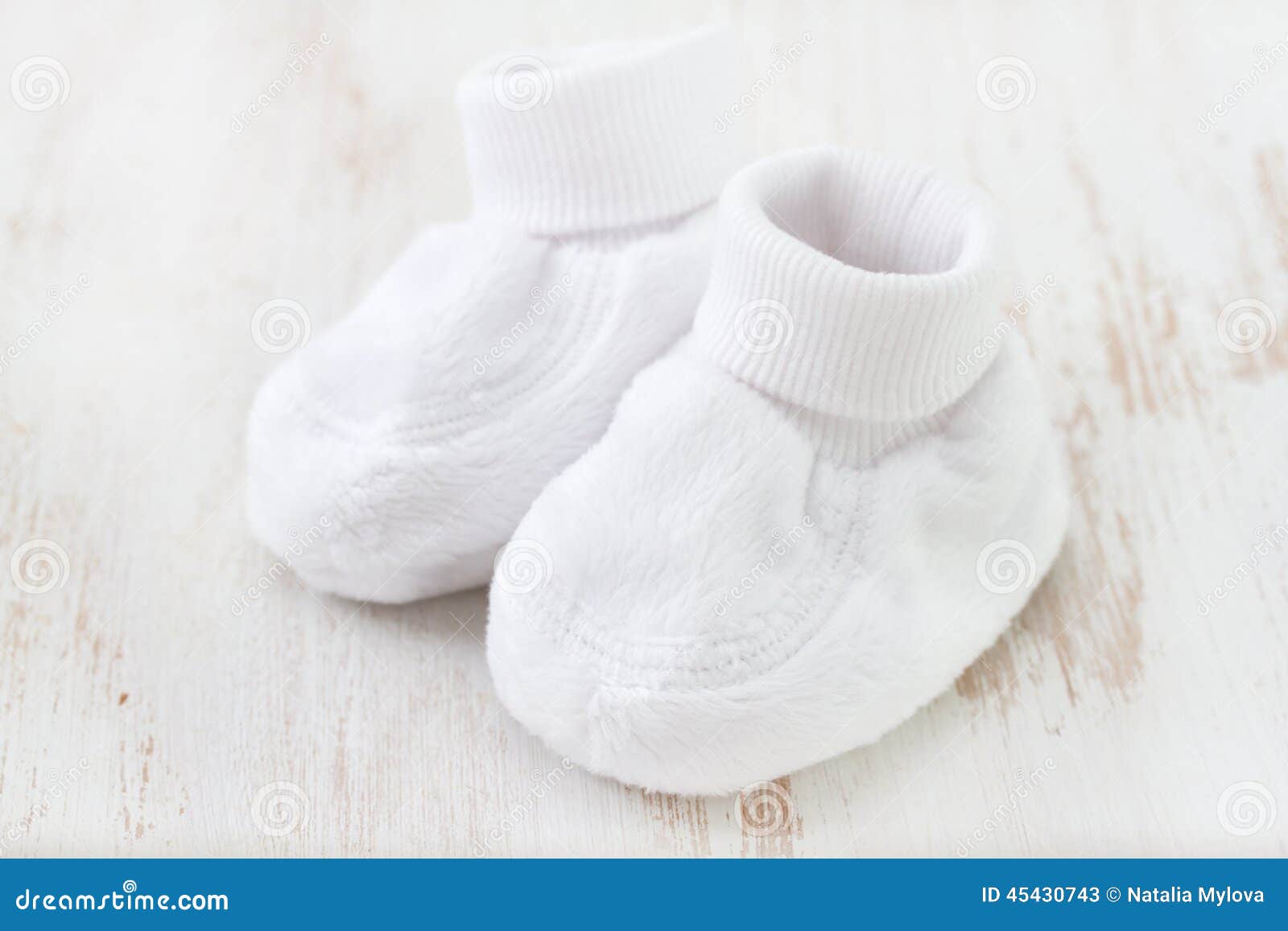 White baby socks on white stock image. Image of child - 45430743