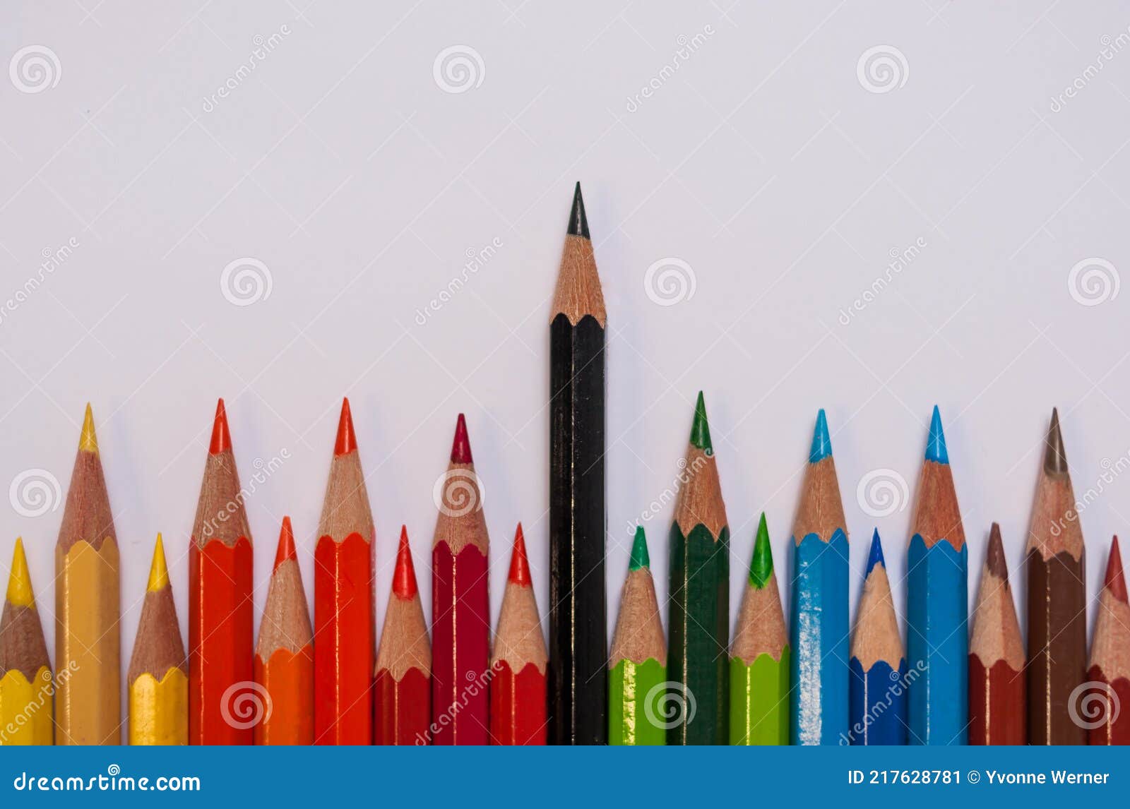 White Background with a Parallel Arrangement of Colored Pencils Stock ...