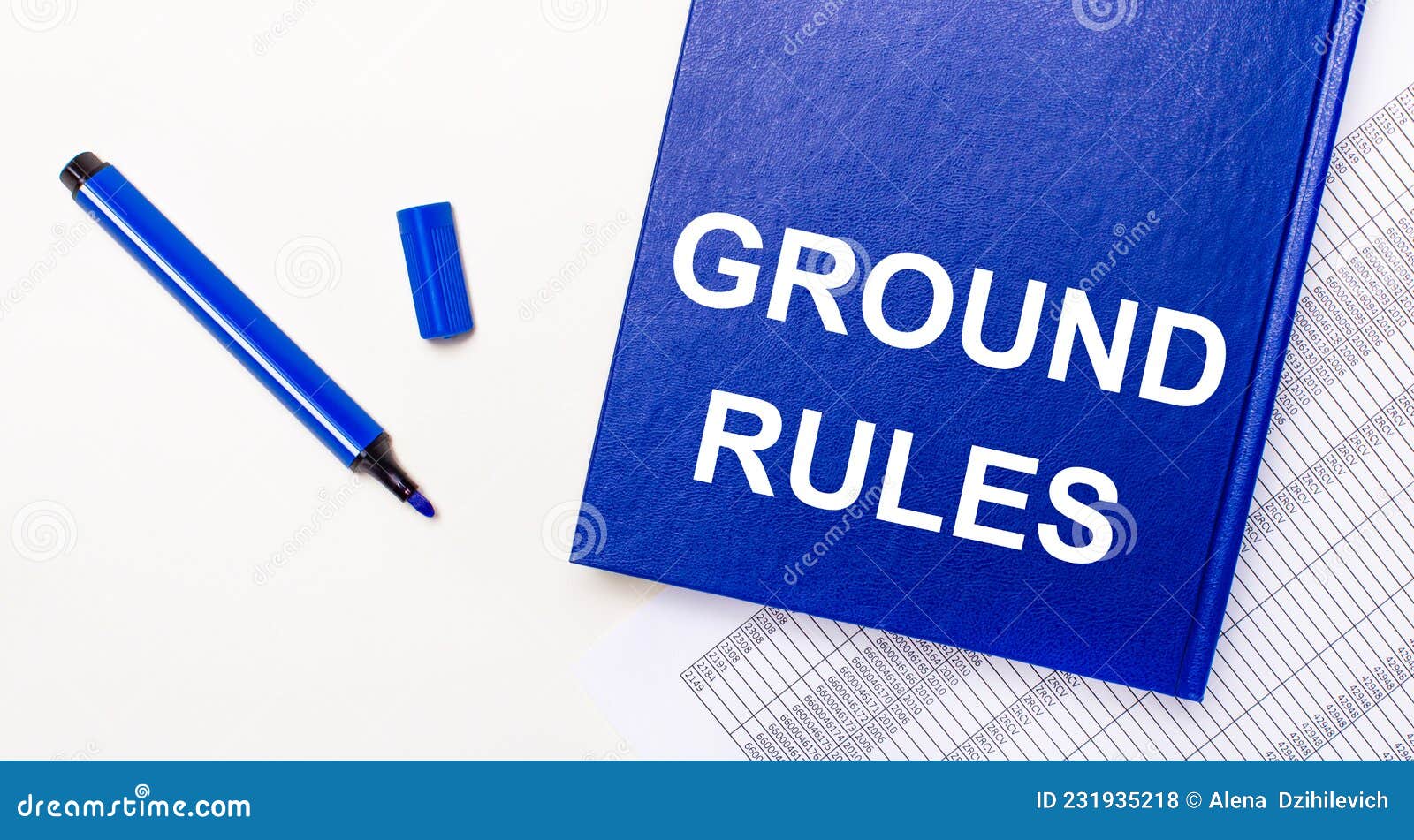 On a White Background Reports, a Blue Pen and a Blue Notebook with the ...