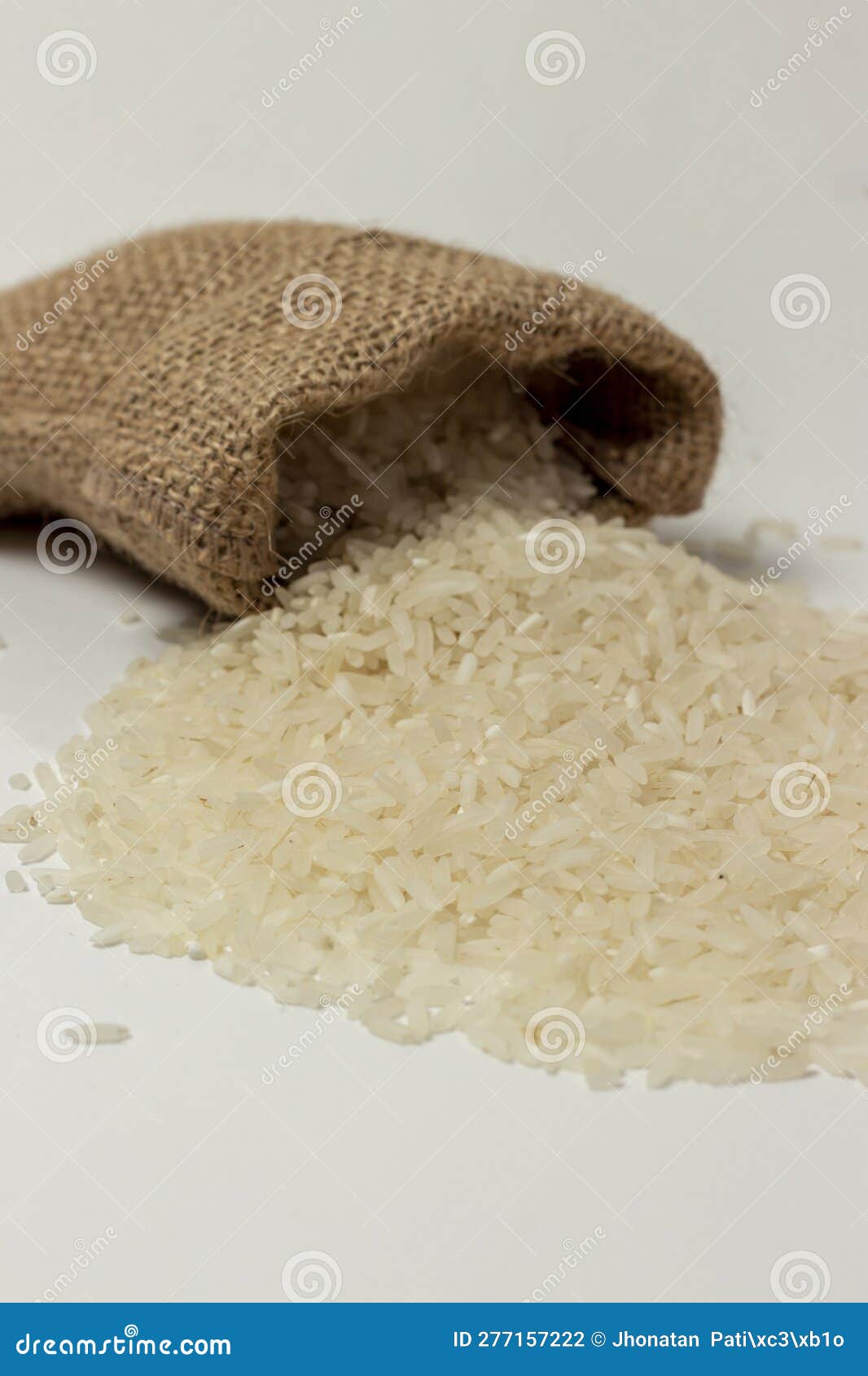 White Background - Spilled Rice Grains Stock Photo - Image of ...