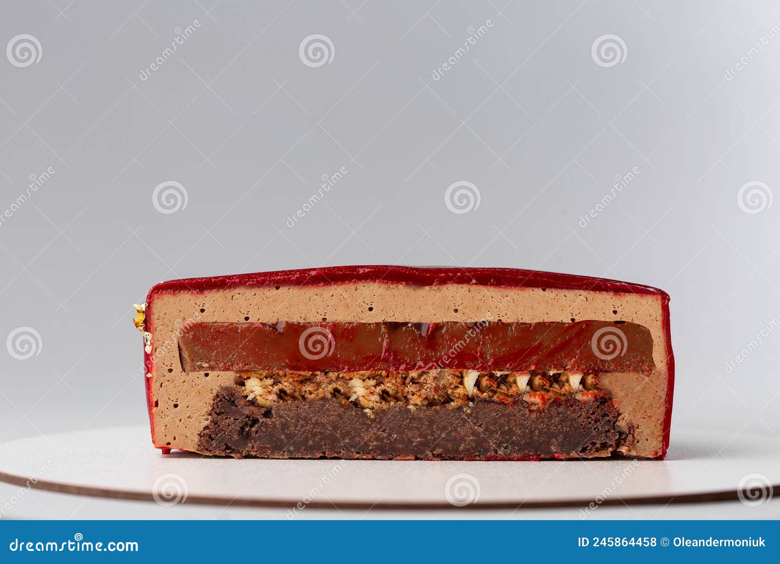 On a White Background, a Sweet Pastry Cake is Cut in Half, the Cake is ...