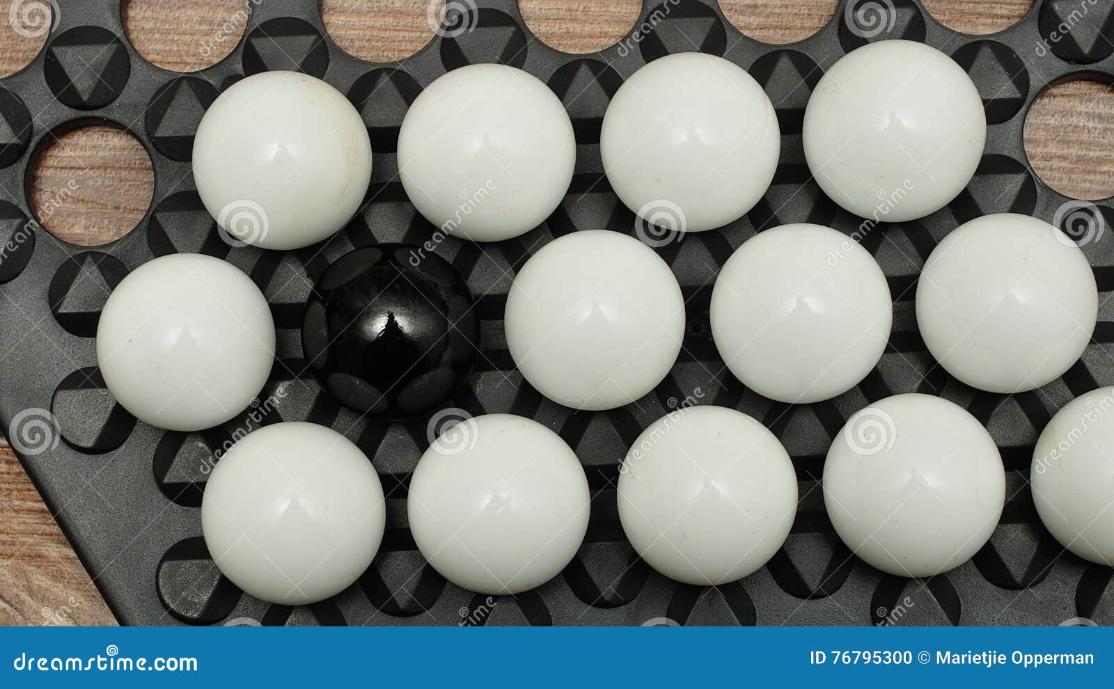 White Balls with only One Black Ball Stock Photo - Image of business ...