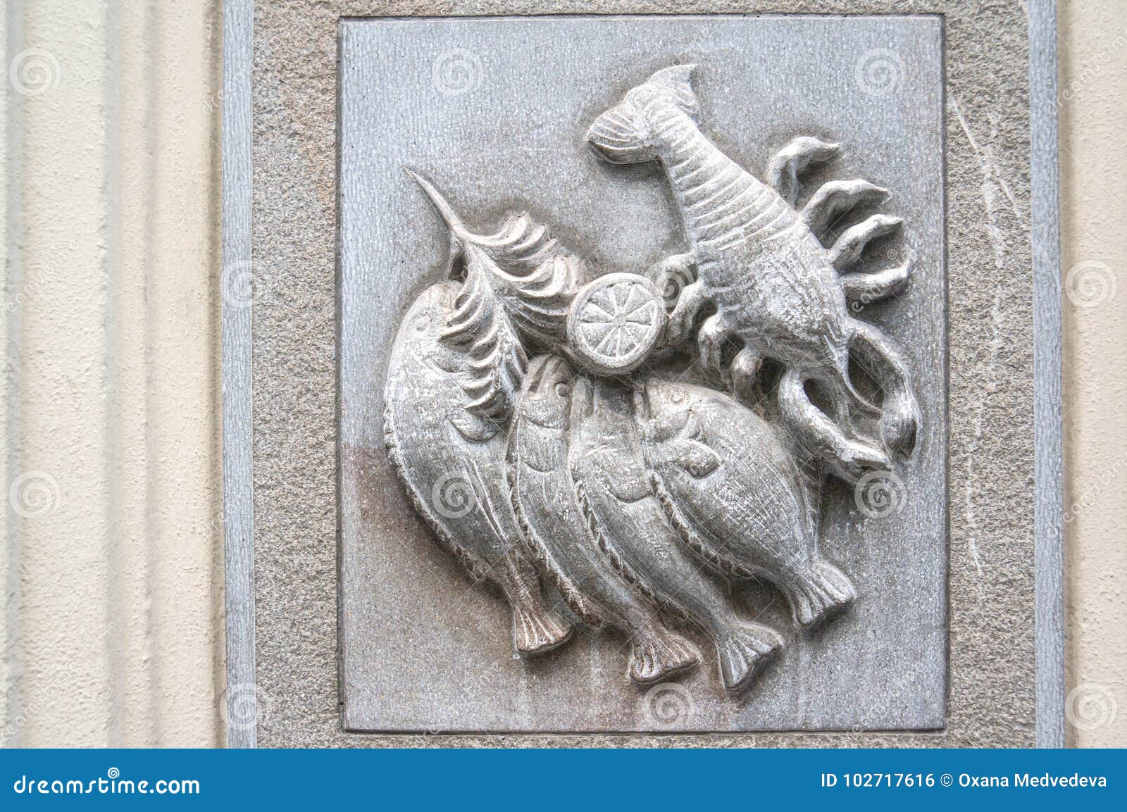 White Bas-relief Figure of a Fish and a Lobster. Stock Photo - Image of ...
