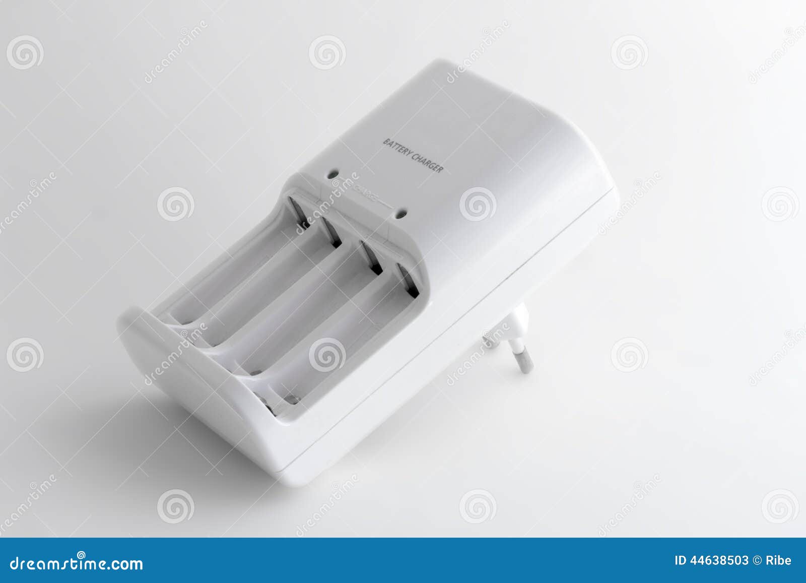 White battery charger stock image. Image of electrical - 44638503