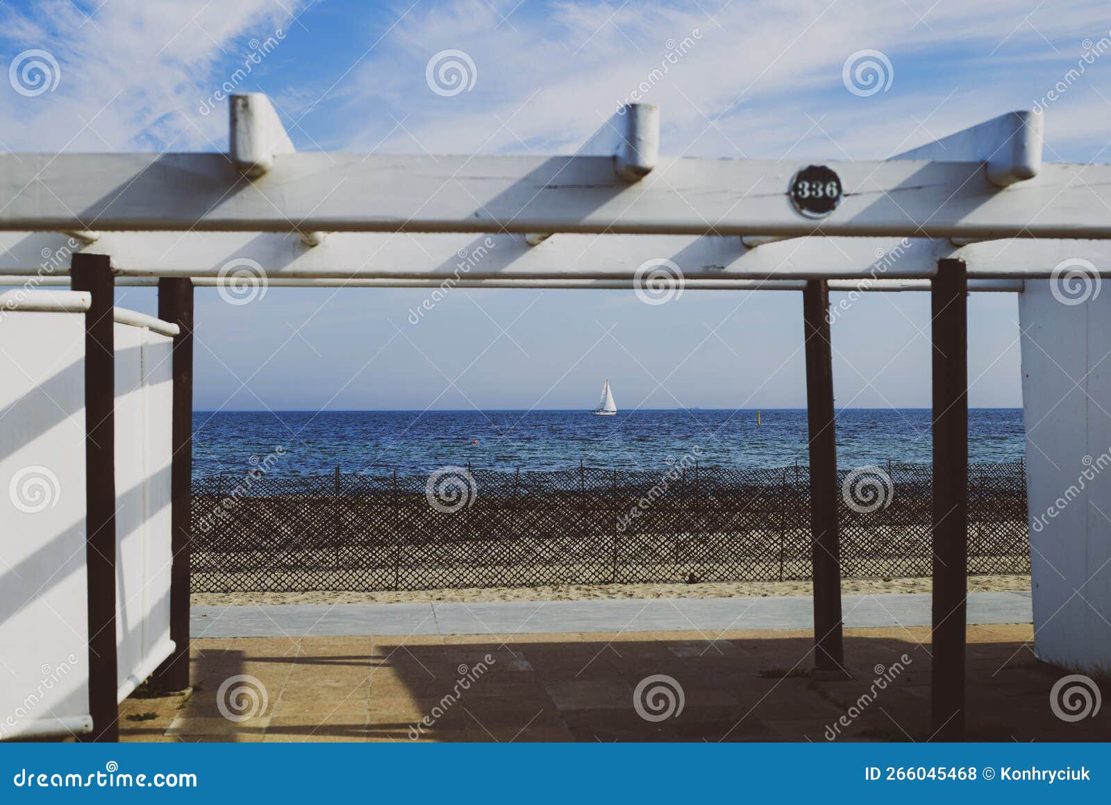 White Beach Buildings with Seascape in the Background Stock Photo ...