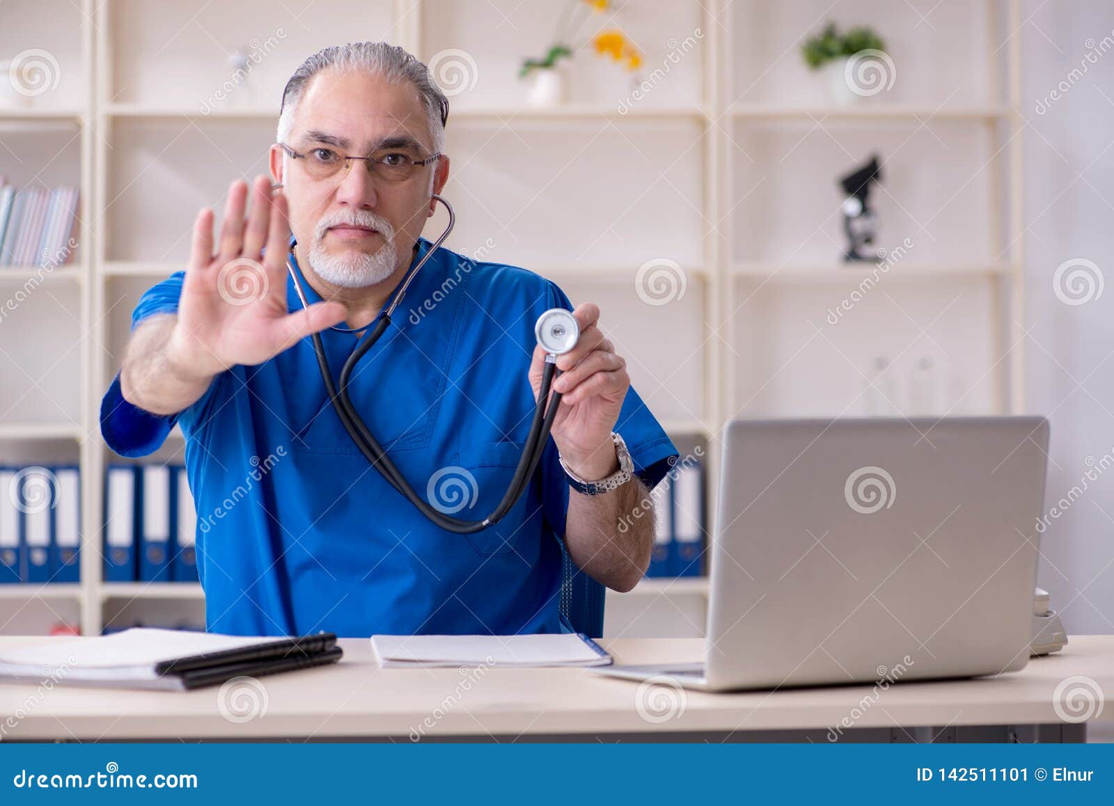 The White Bearded Old Doctor Working in Clinic Stock Image - Image of ...