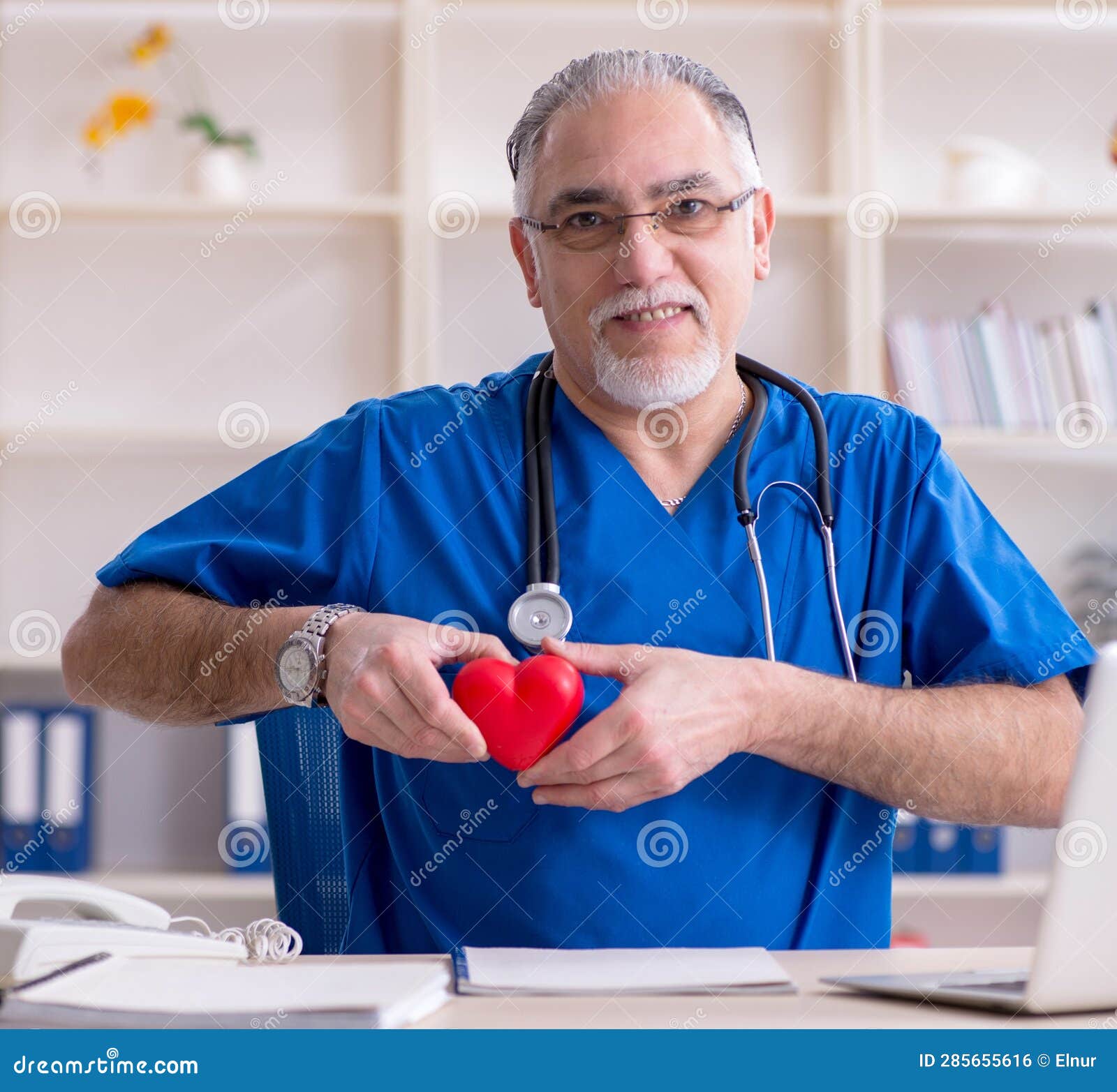 White Bearded Old Doctor Working in Clinic Stock Photo - Image of ...