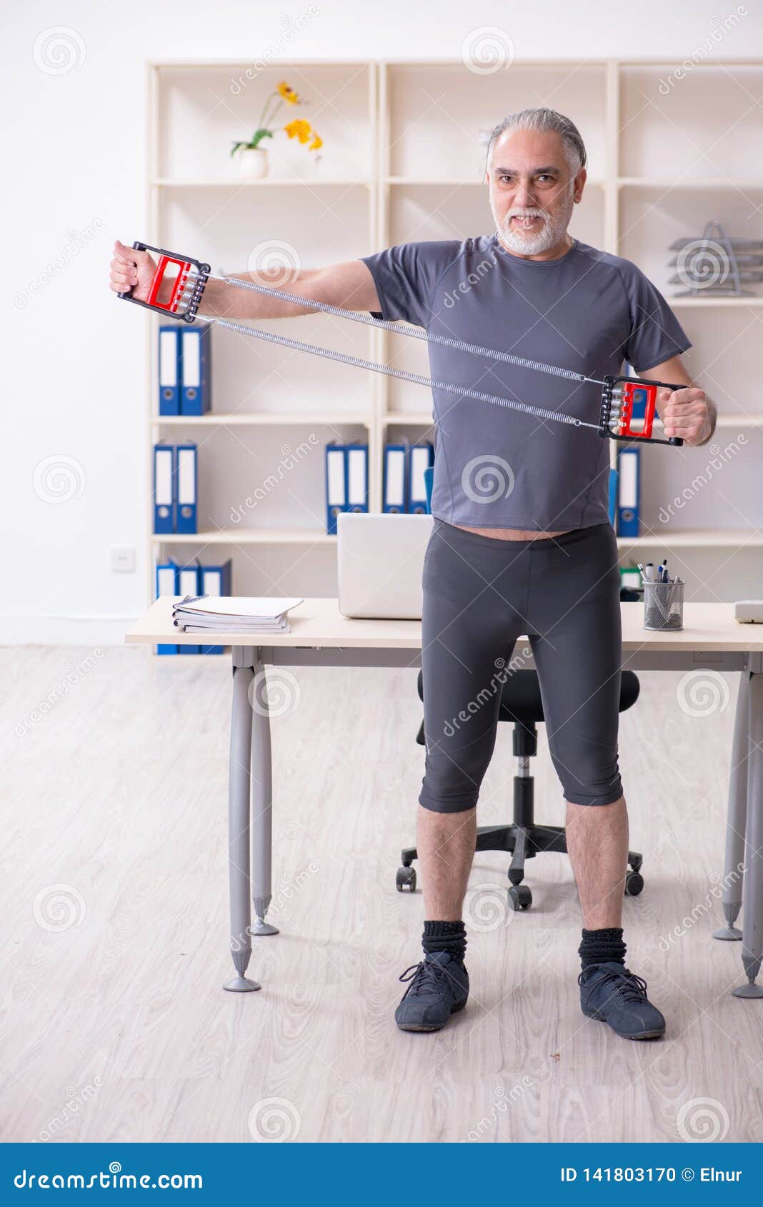 The White Bearded Old Man Employee Doing Exercises in the Office Stock ...