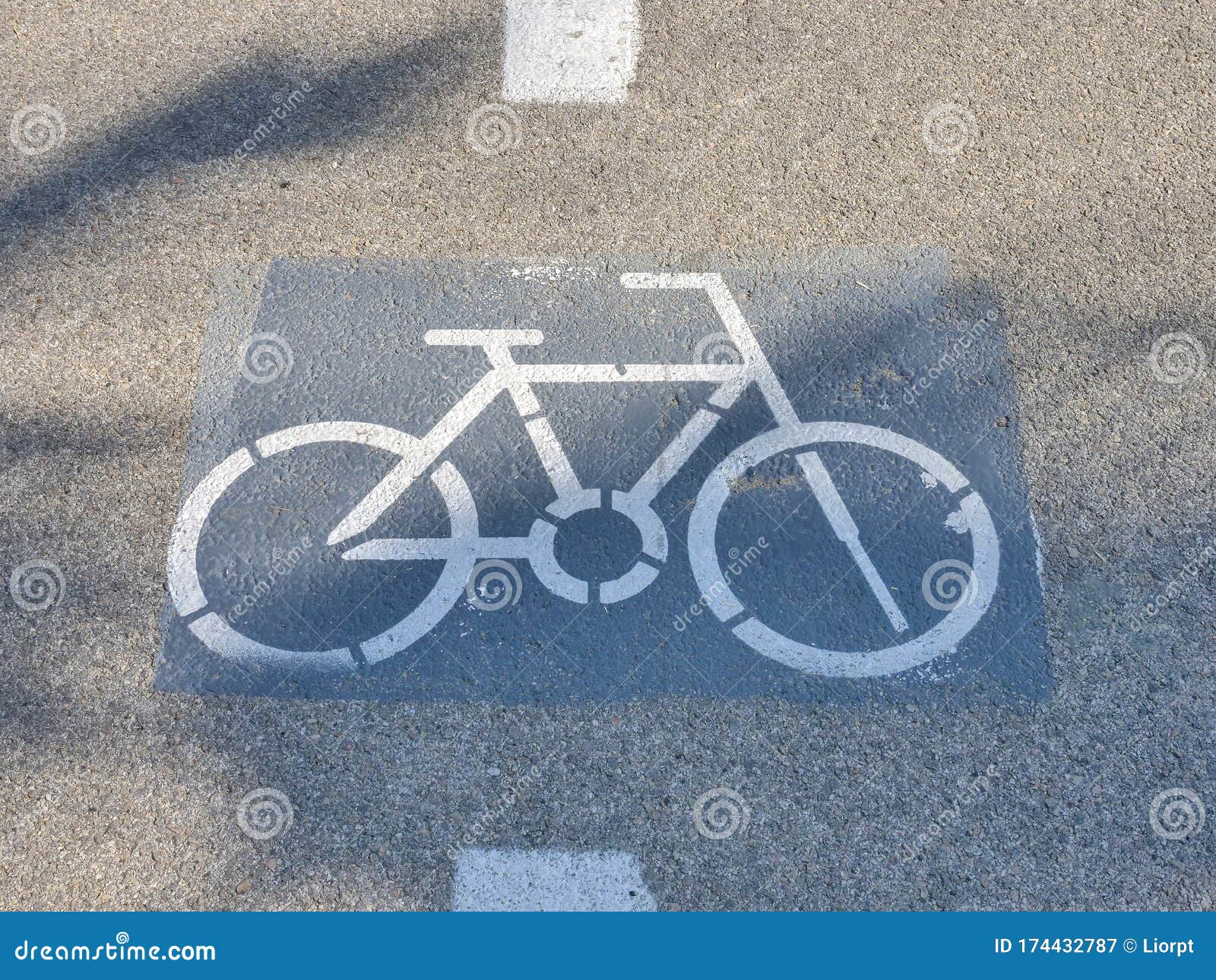 White Bicycle Lane Mark on an Asphalt Road. Stock Image - Image of ...