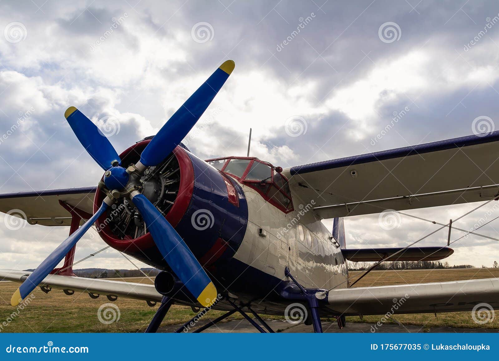 White Biplane Standing on Airports with Cloud Sky Stock Image - Image ...