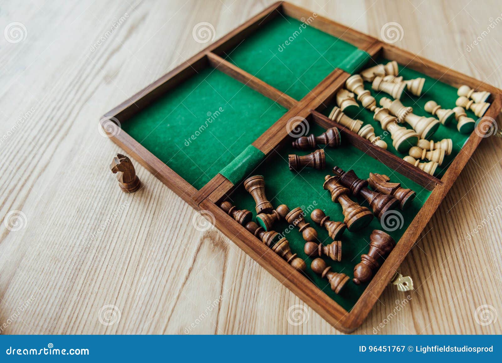 White and Black Chess Figures Inside of Inverted Chess Board Stock ...