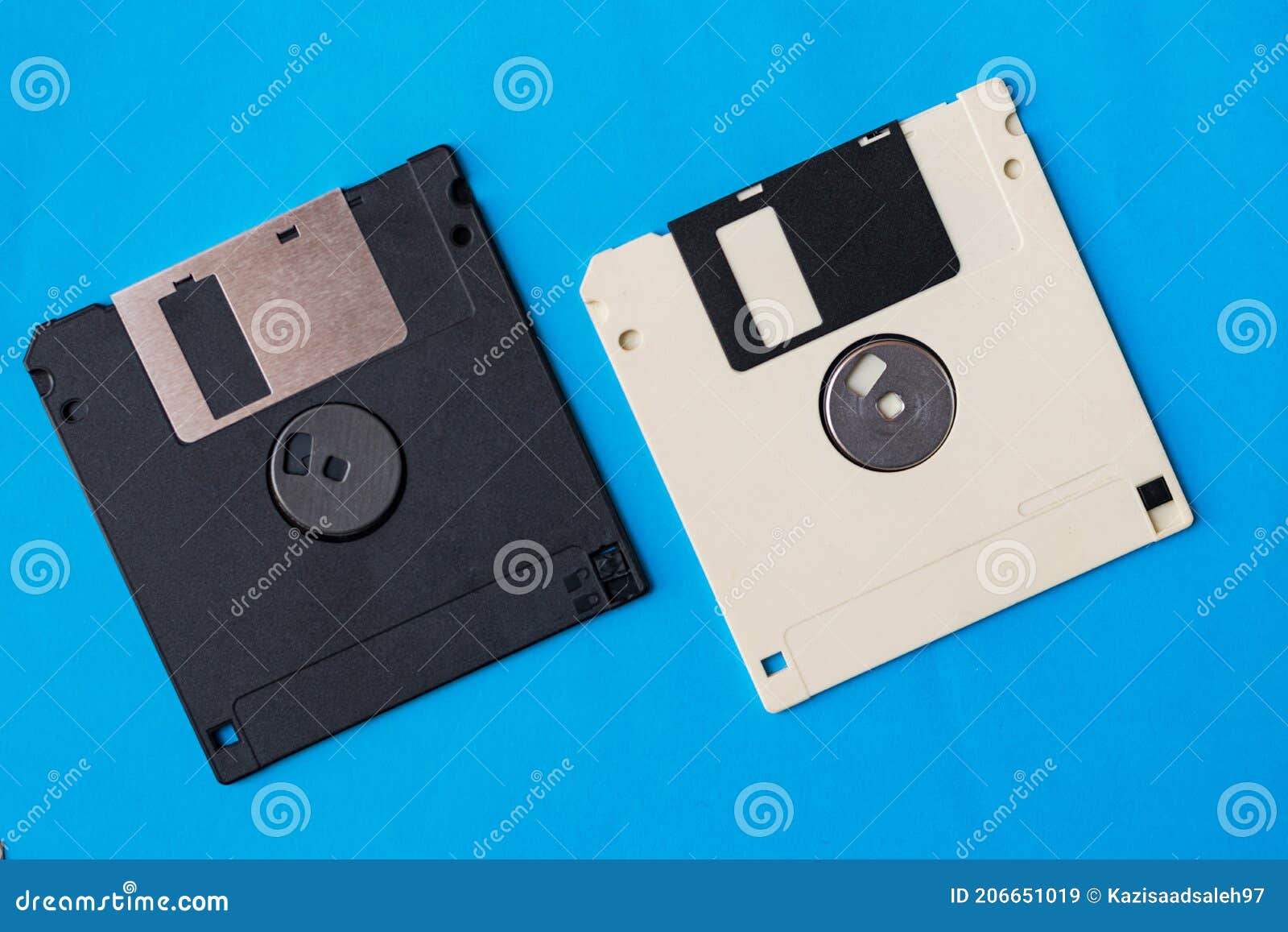 A White and a Black Floppy Disk on a Plain Background Stock Image ...