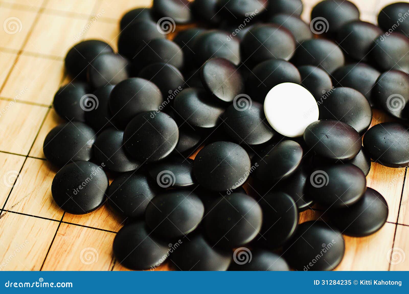 WHITE on BLACK GO STONES stock image. Image of japanese - 31284235