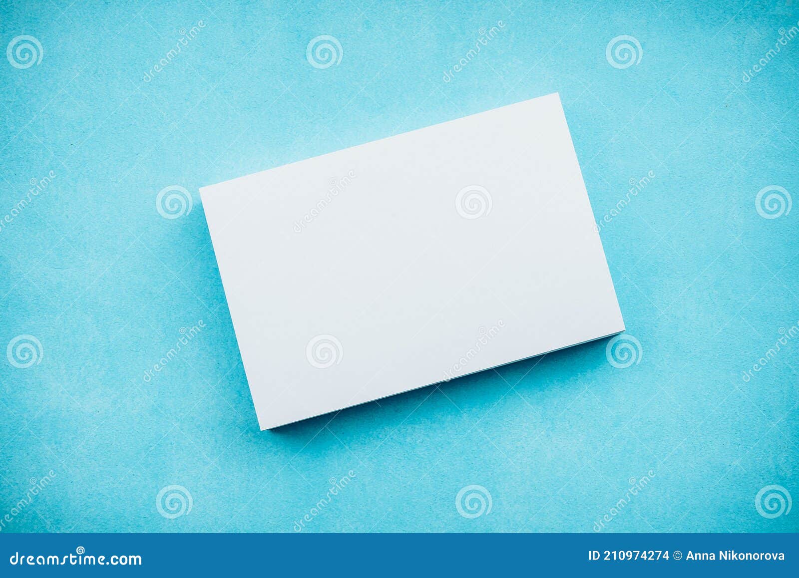 White Blank Cards in a Stack on a Blue Background. a Gentle Romantic ...