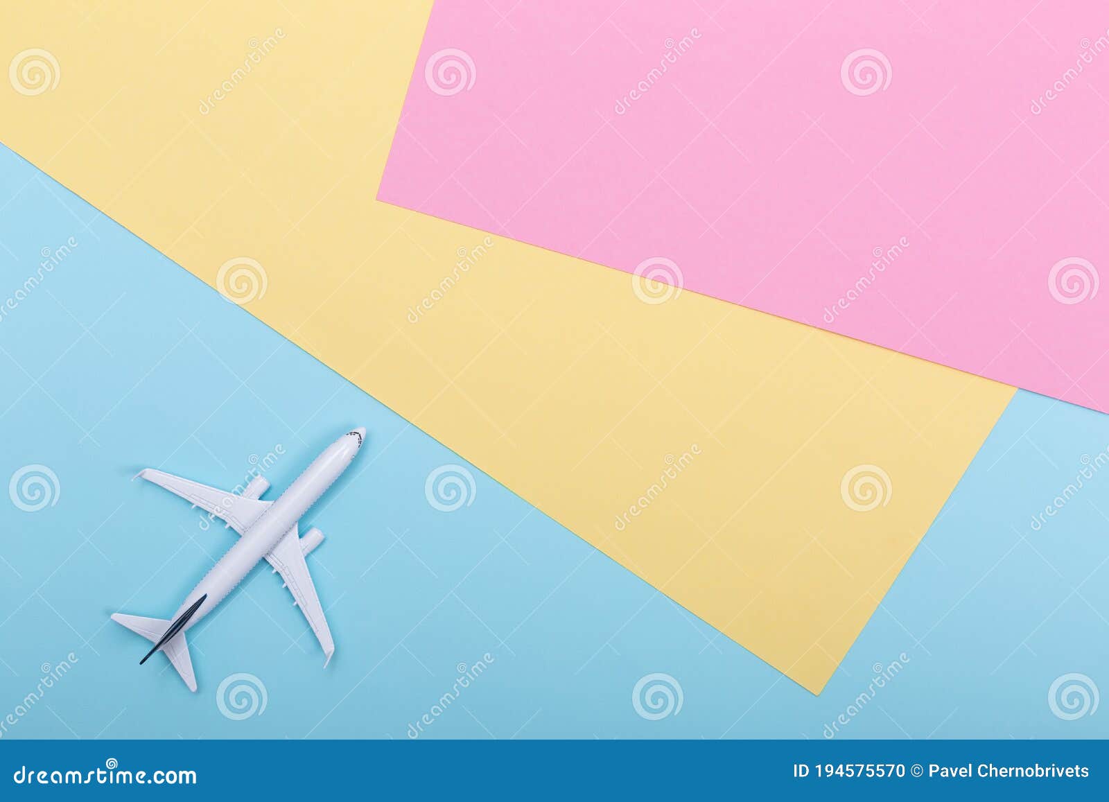 White Blank Model of Passenger Airplane on Serenity Colored Paper ...