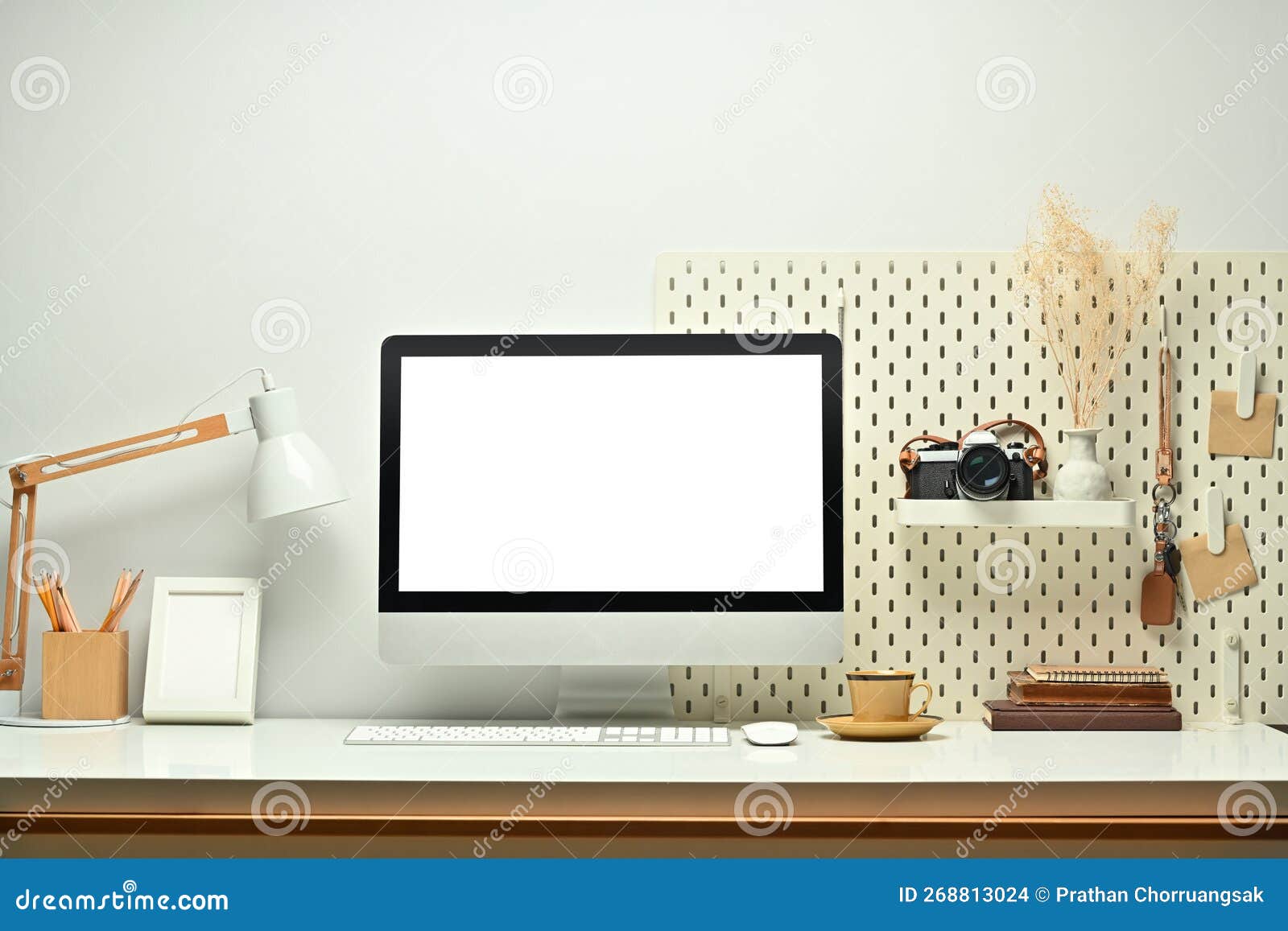 White Blank Screen Computer Monitor, Picture Frame, Camera and Books on ...
