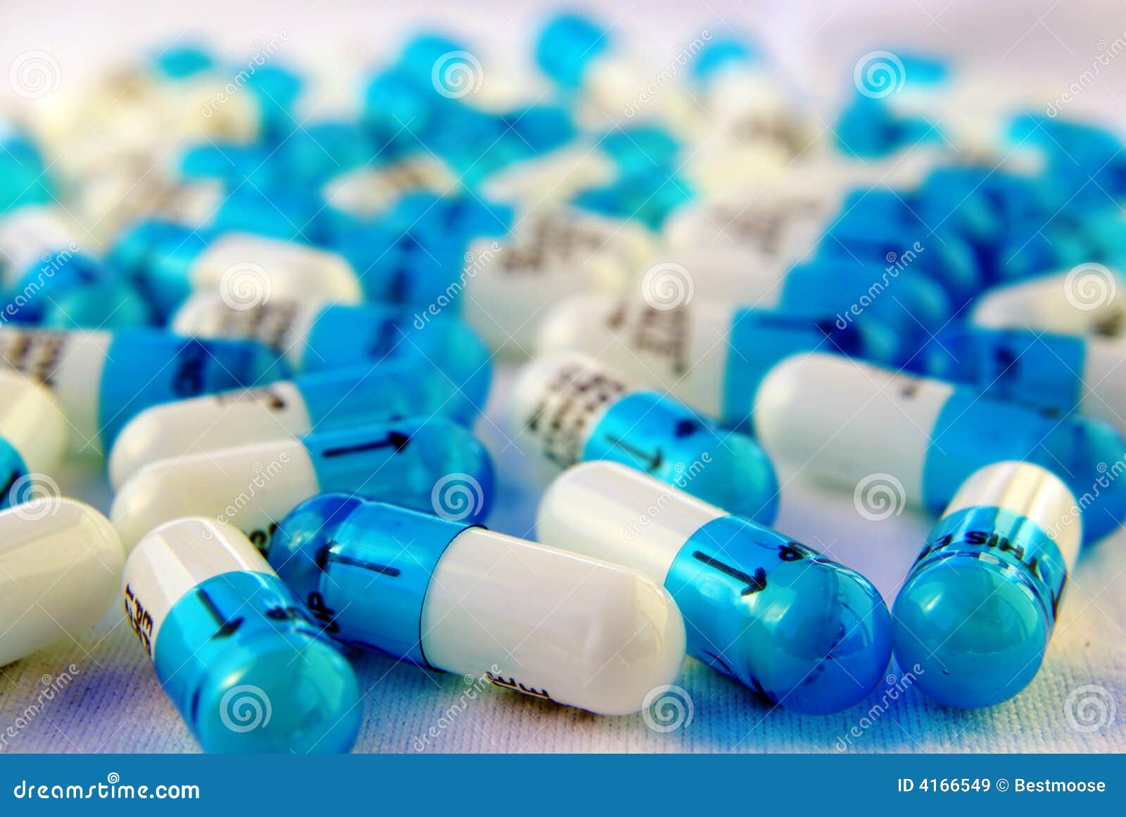 White and blue capsules stock image. Image of pharmaceutical - 4166549