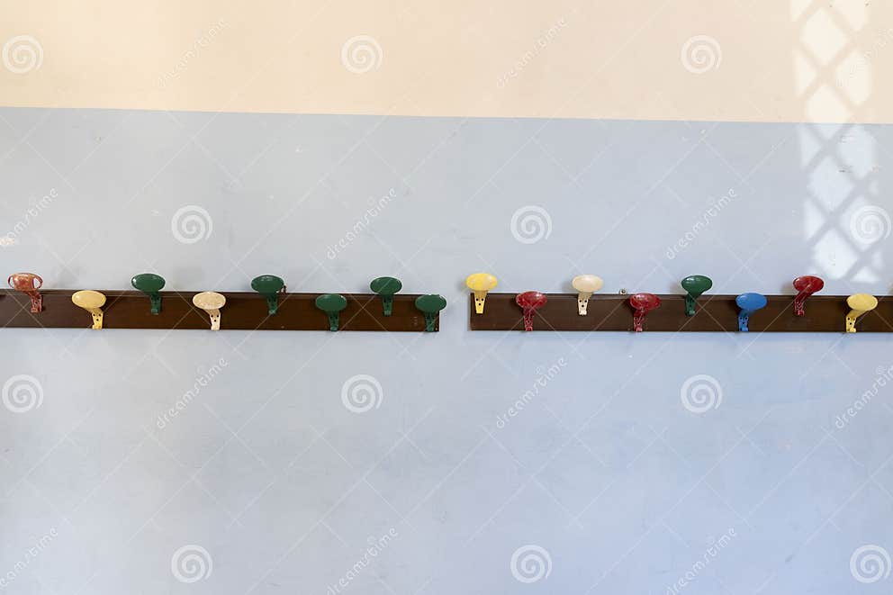 White and Blue Wall with School Coat Rack Stock Photo - Image of ...