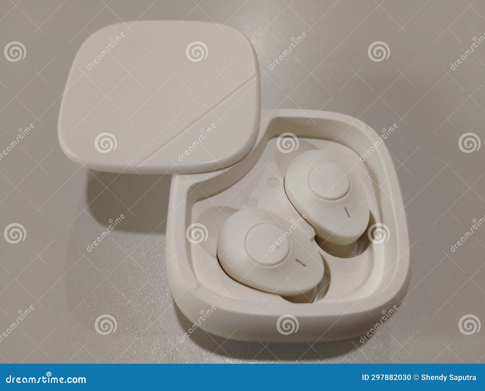 White Bluetooth Tws that Opens with Two Earbuds Inside Stock Photo ...