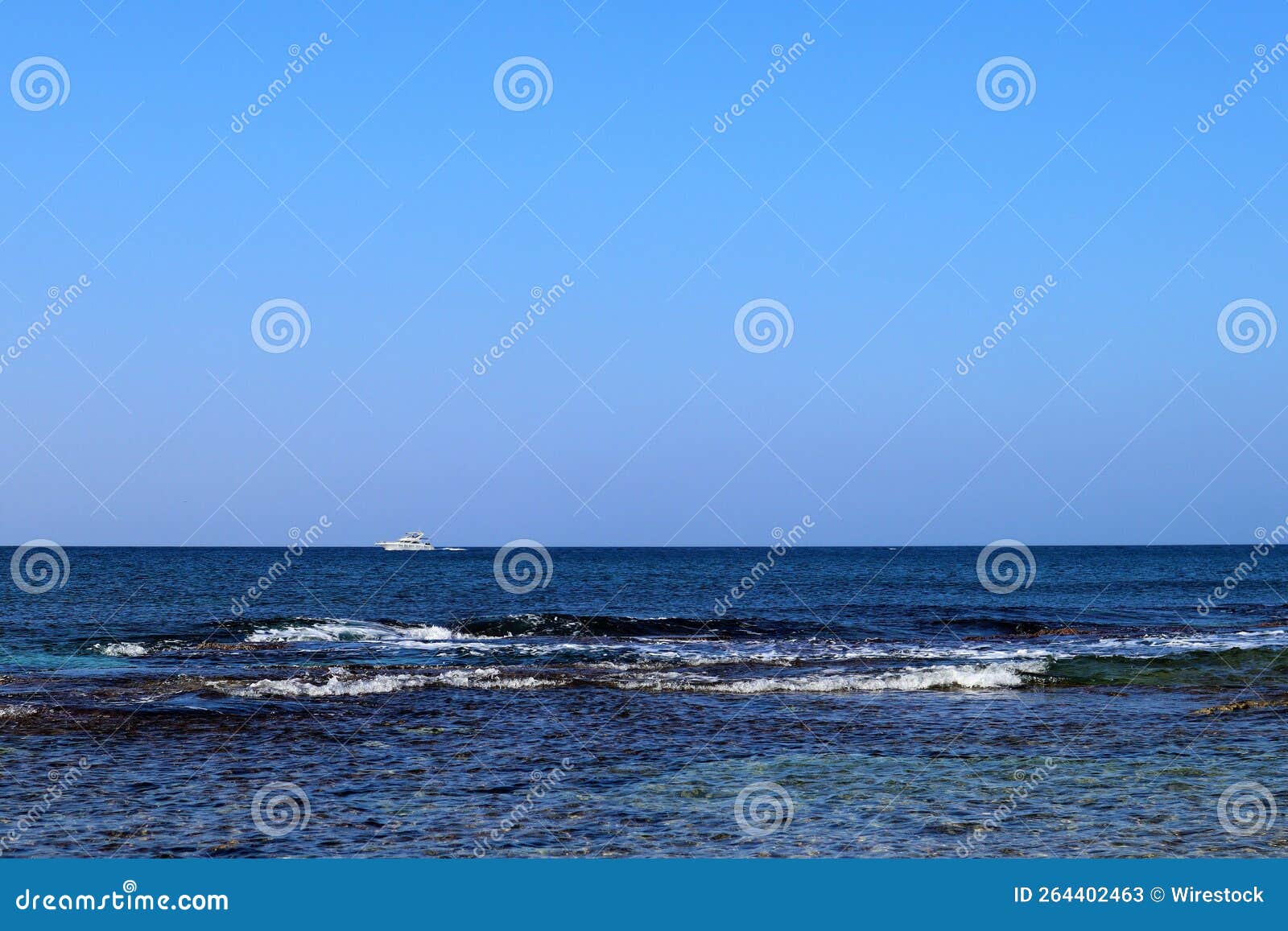 White Boat Sailing on Horizon in the Calm Bright Blue Sea Stock Image ...